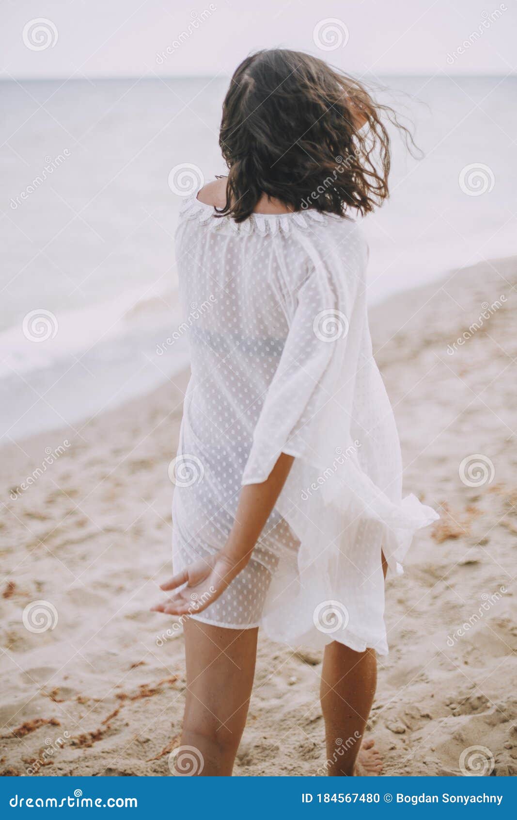Carefree Boho Girl In White Summer Dress Walking On Beach Happy Young
