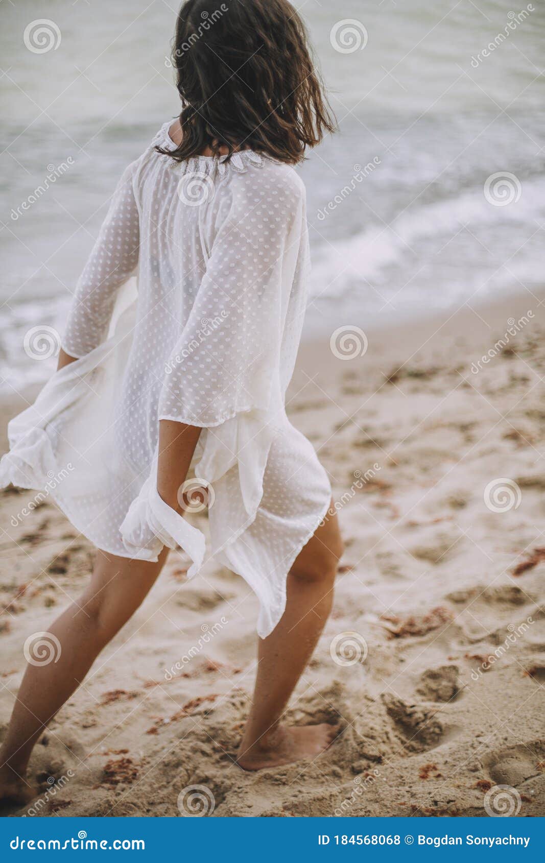 Carefree Boho Girl In White Summer Dress Walking On Beach Happy Young