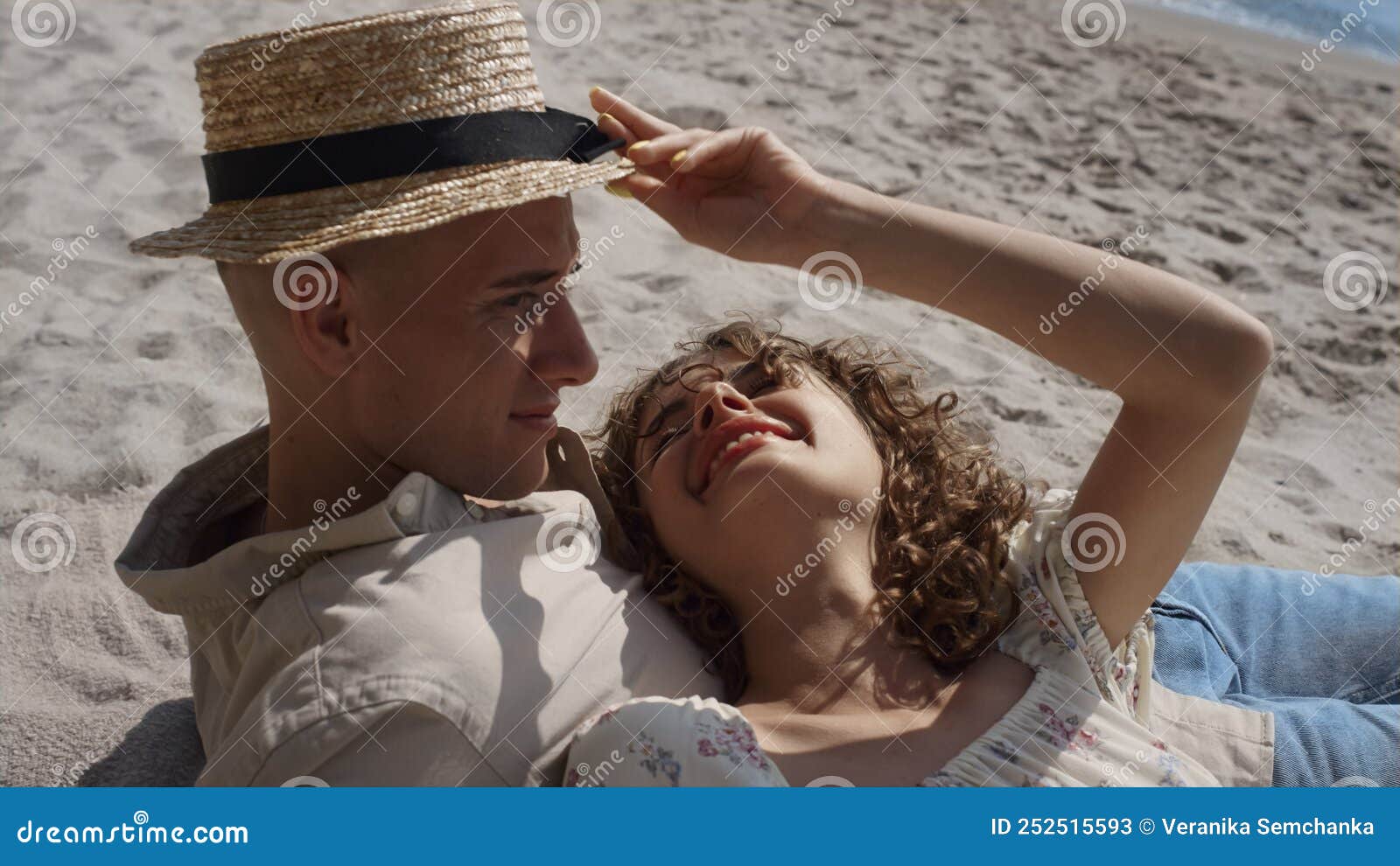 Carefree Couple Lying Sand Beach Summer Time Close Up Girl Putting Hat