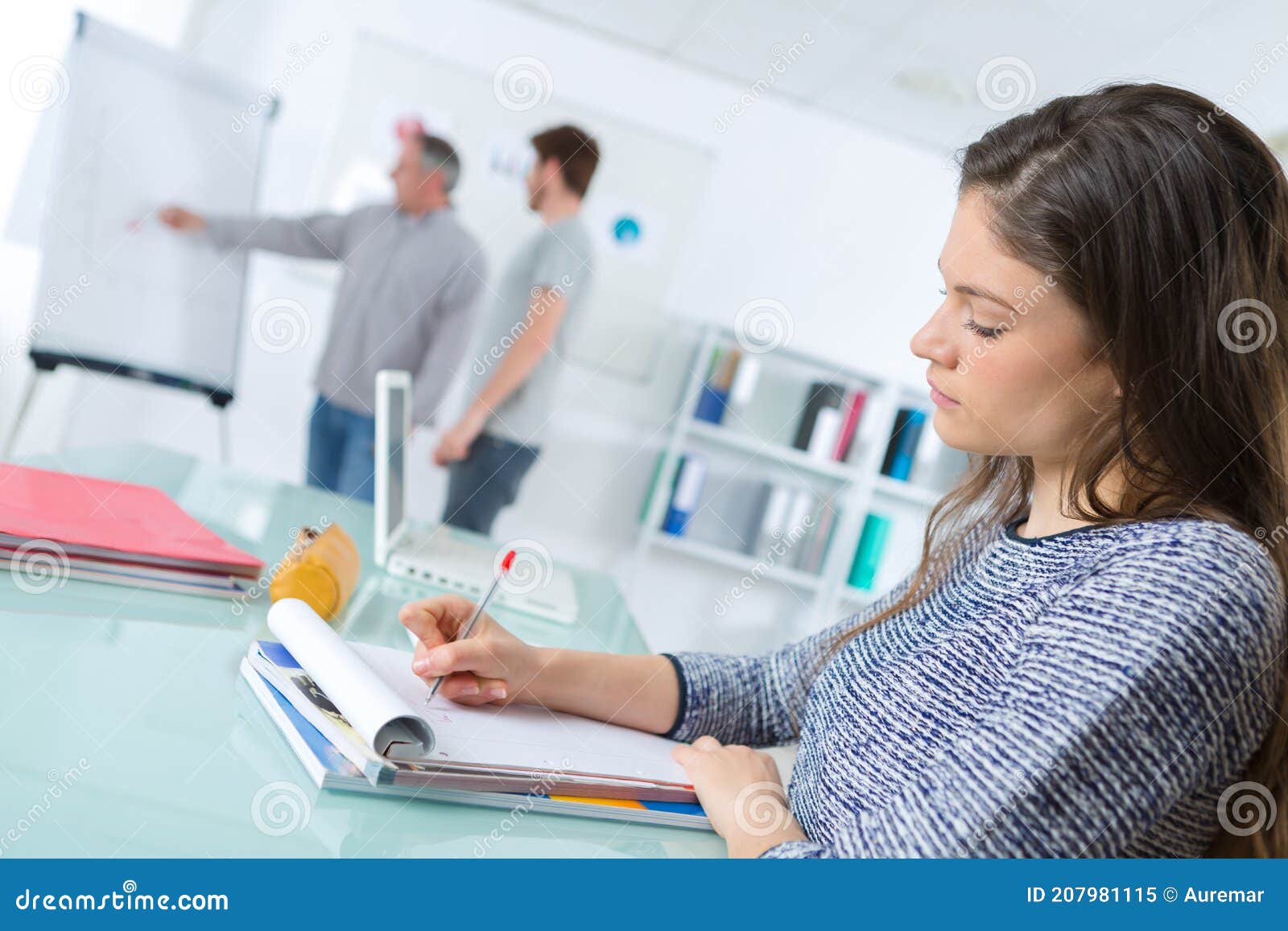 Careful Female Student Taking Notes in Class Stock Image - Image of ...