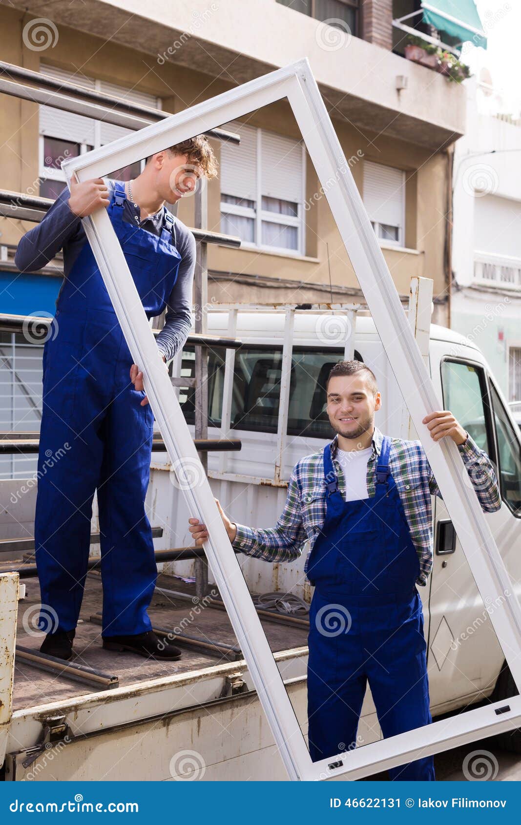 Careful Workmen Carrying Windows Frames from Truck Stock Image - Image ...