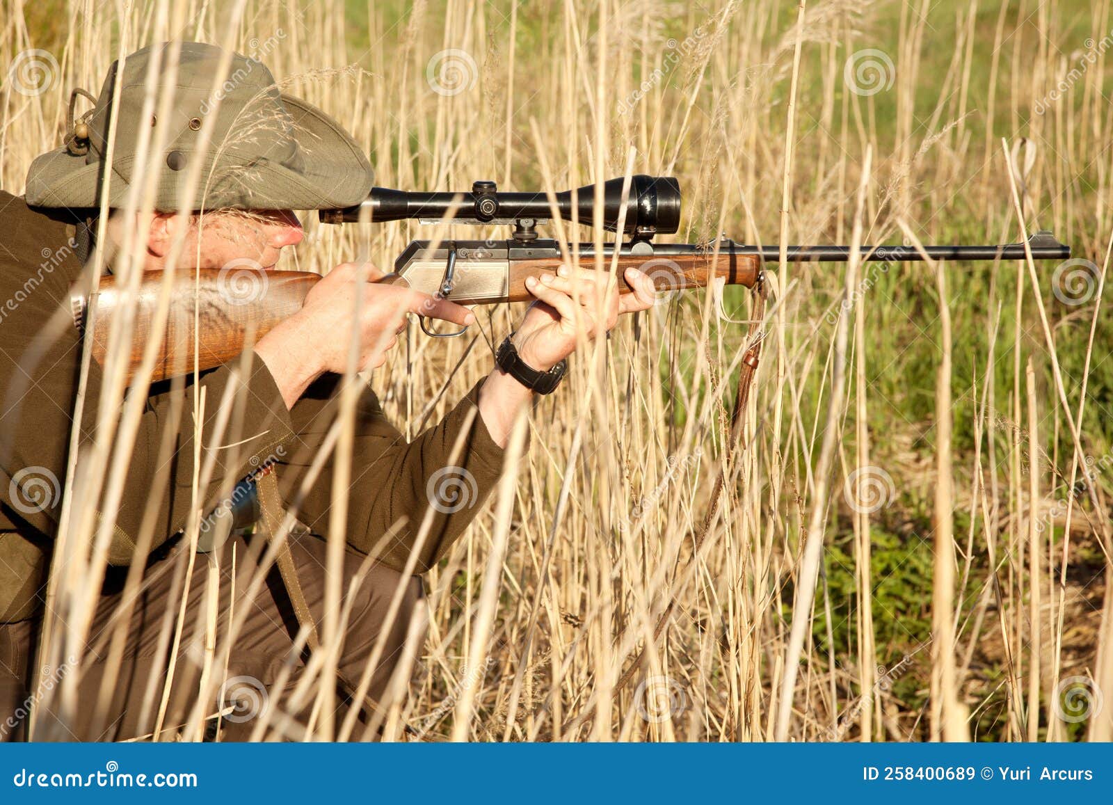 Carefully Concealed. a Man Hunting in the Wild. Stock Image - Image of ...