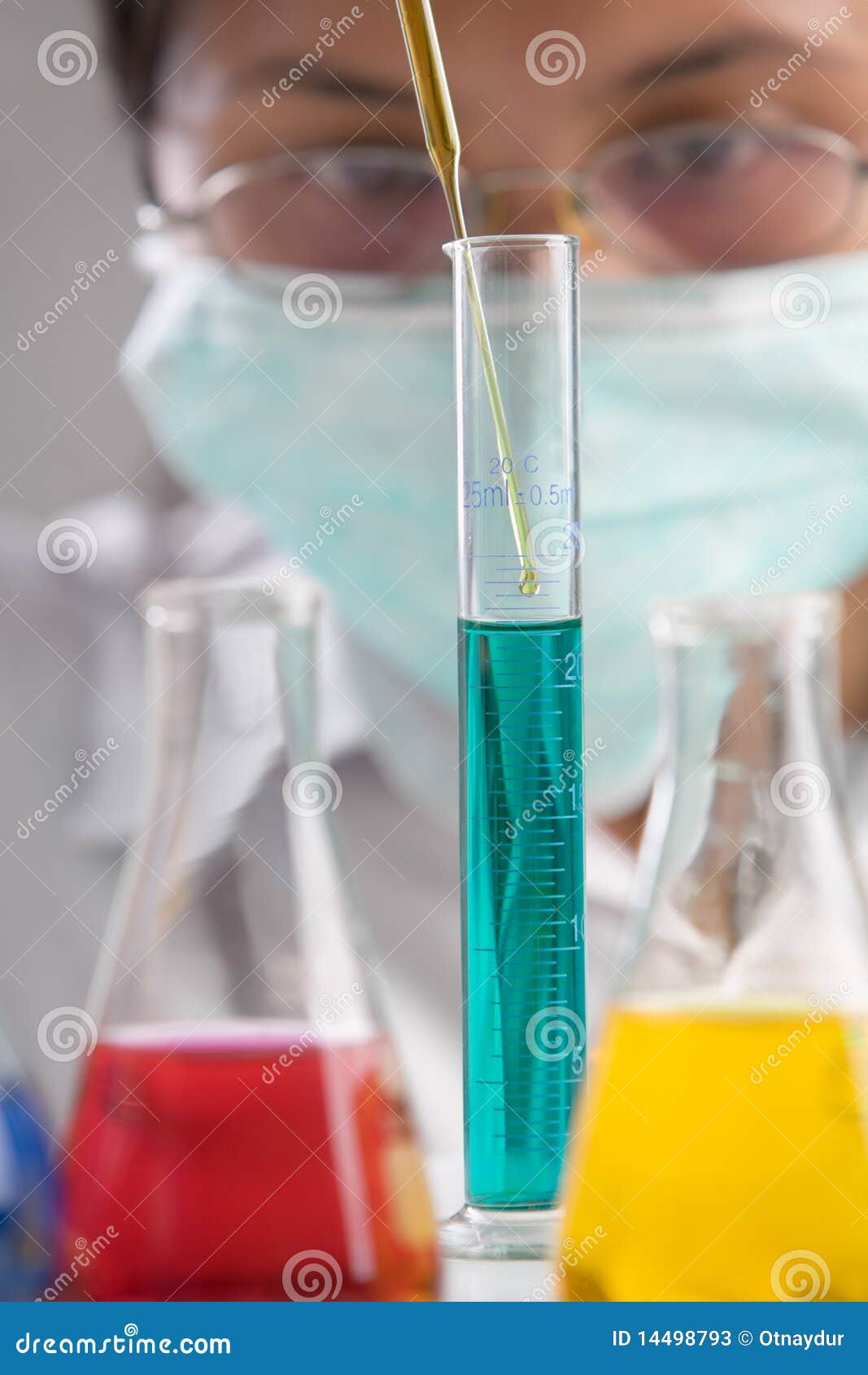 Carefully mixing solution stock image. Image of mask - 14498793