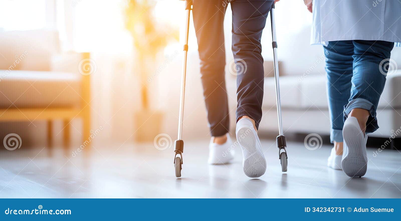 A Caregiver Helps a Patient with Crutches, Promoting Mobility and ...