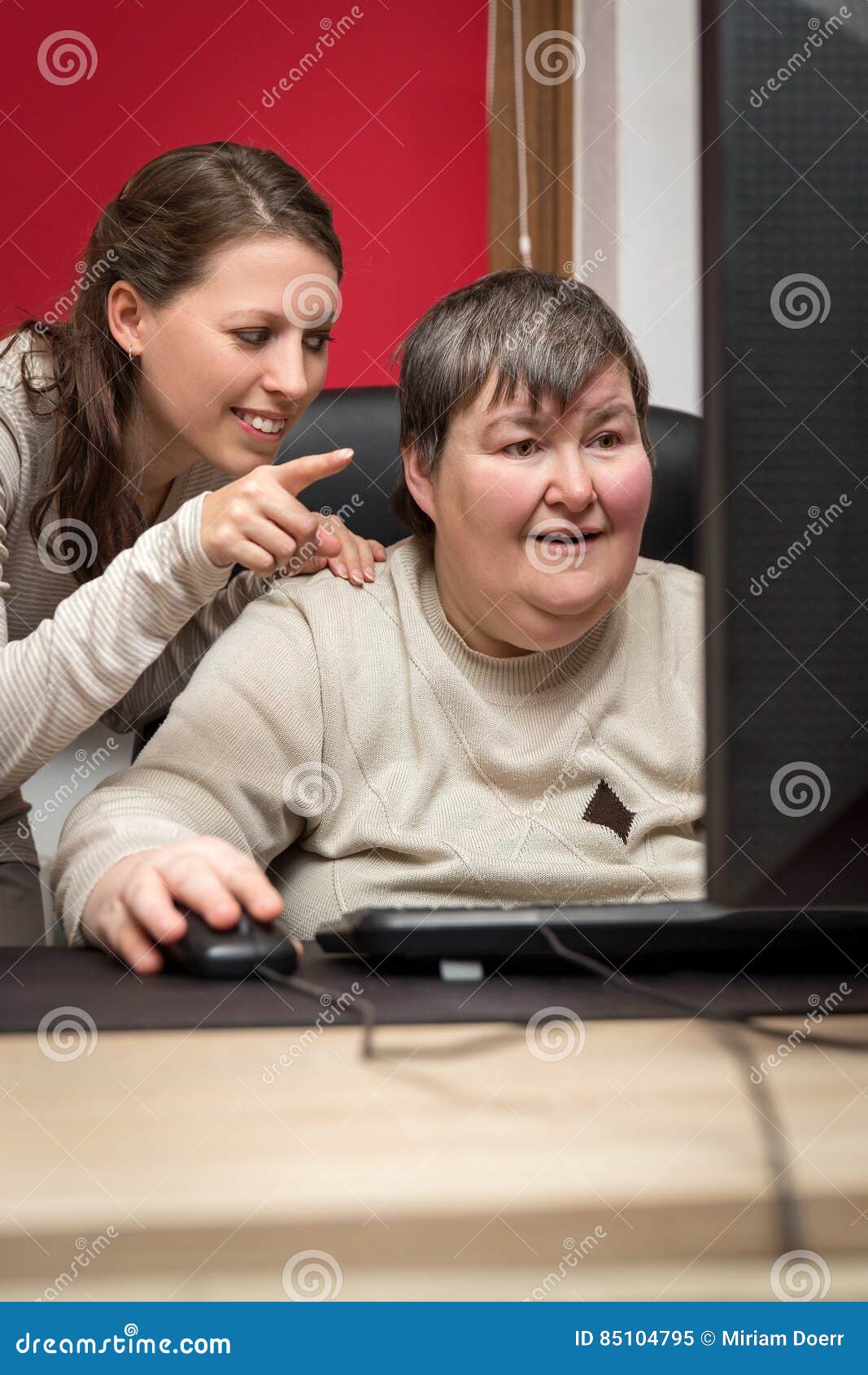 Caregiver Teaching a Special Program for a Mentally Disabled Woman ...