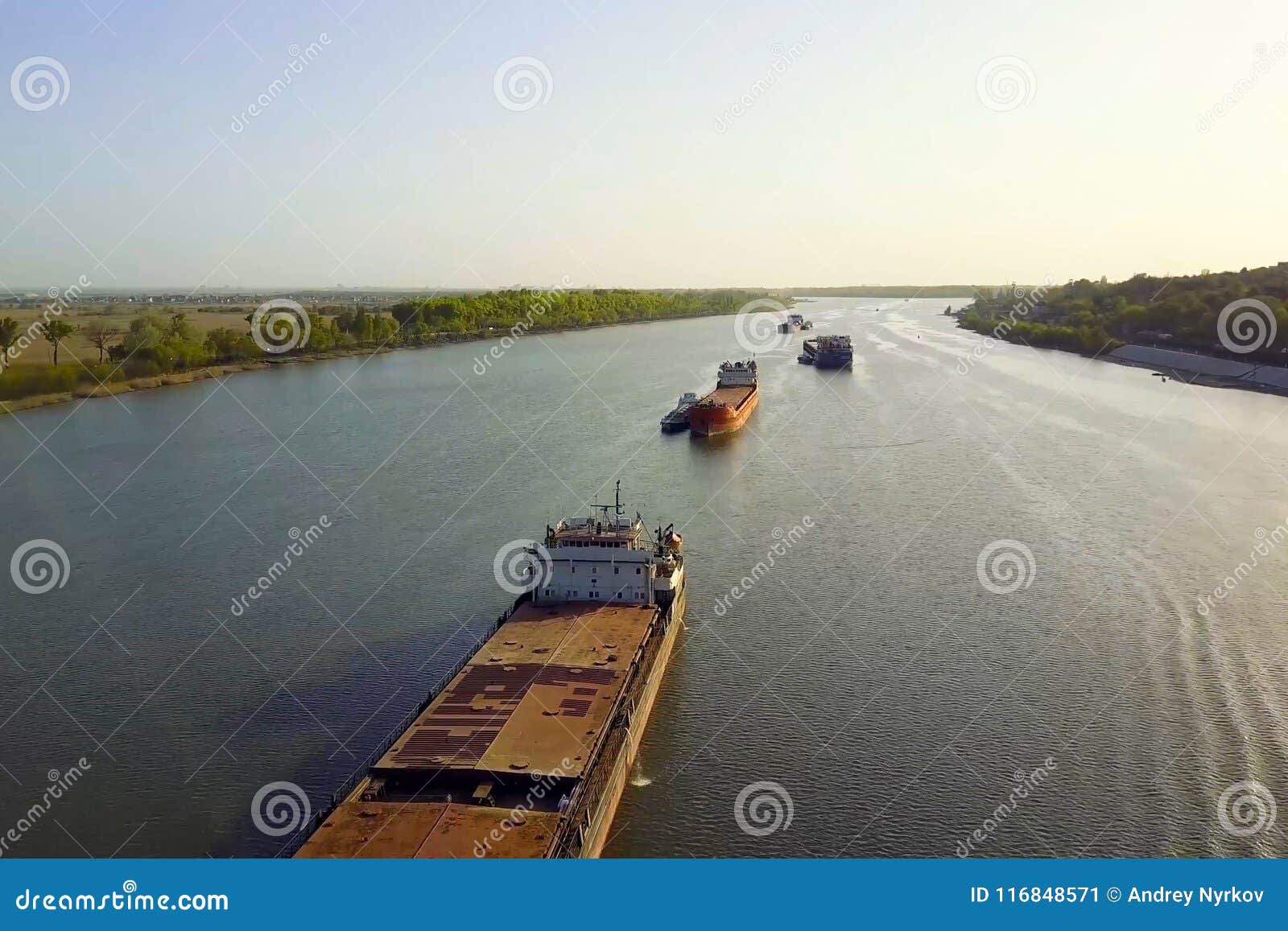 A Cargo Barge Floats Along the River. Cargo Ship. Stock Image - Image ...