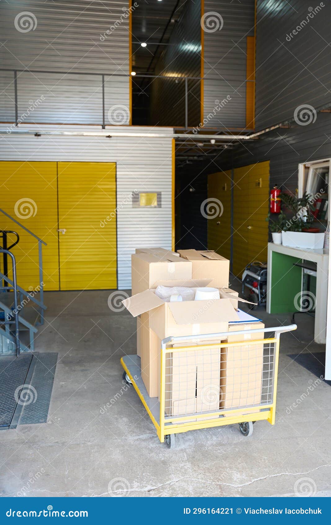 Cargo Cart on Small Wheels Stands at the Freight Elevator Stock Image ...