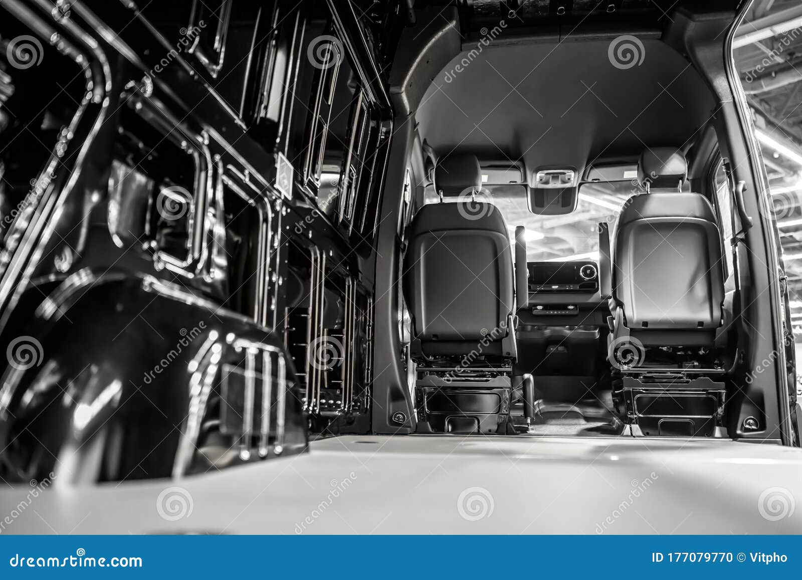 The Cargo Compartment of a Compact Minivan with Open Doors is Ready for ...