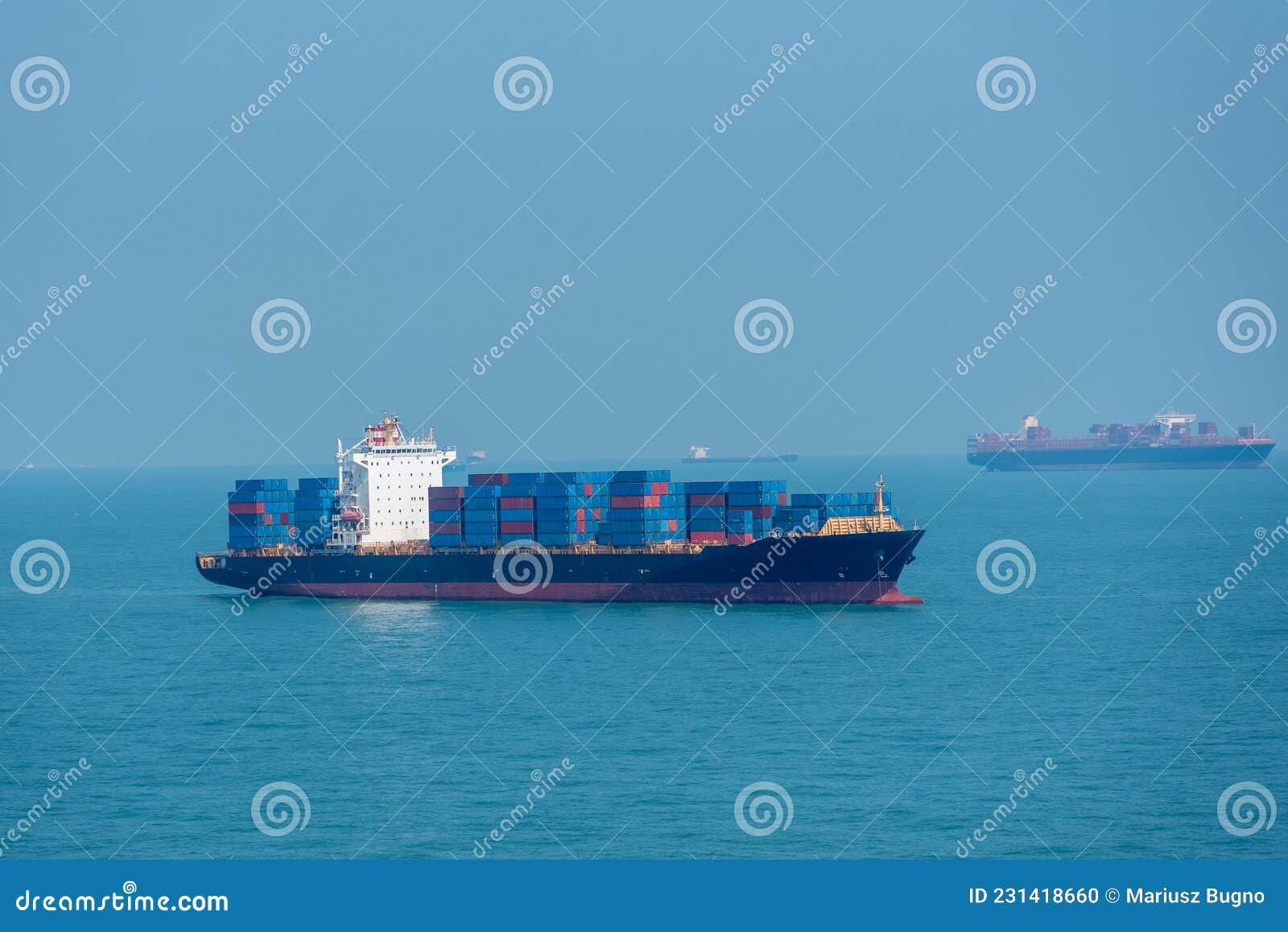 Cargo Container Ship Sailing through Blue, Calm Ocean. Editorial Image ...