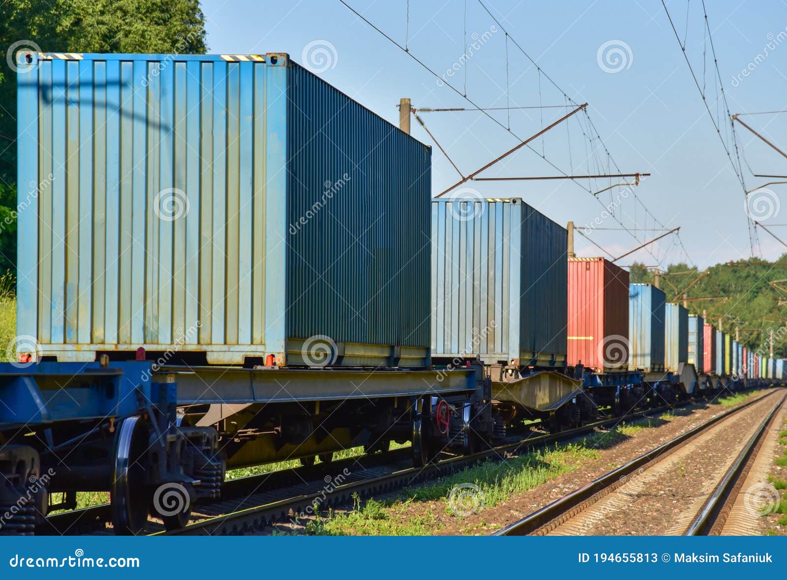 Cargo Containers Transportation on Freight Train by Railway. Intermodal ...