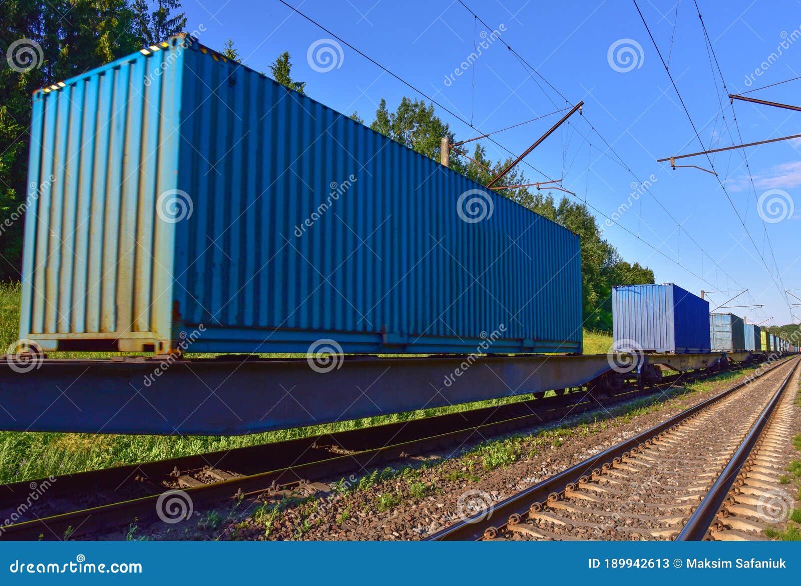 Cargo Containers Transportation on Freight Train by Railway. Intermodal ...