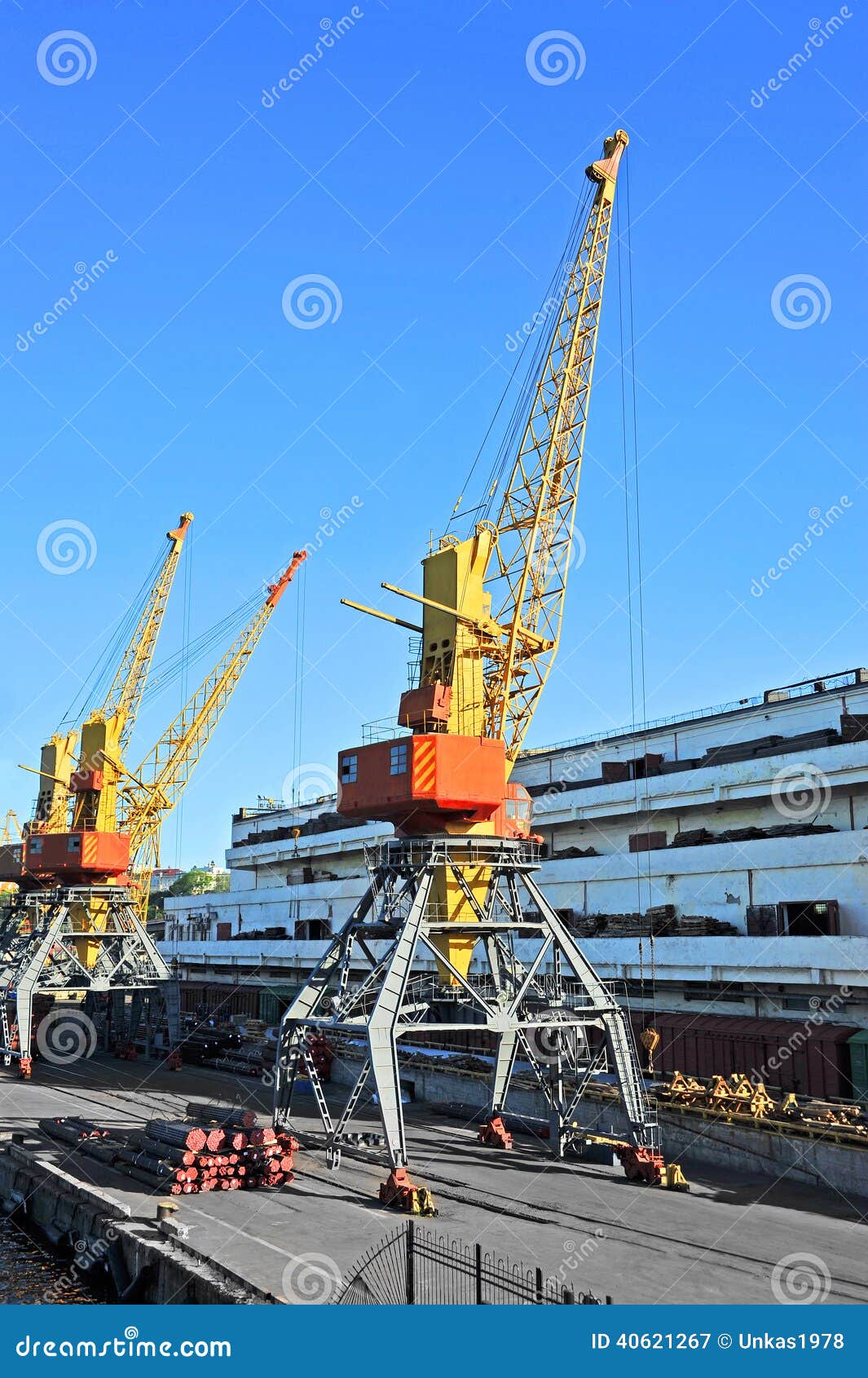 Cargo crane and pipe stack stock image. Image of nautical - 40621267