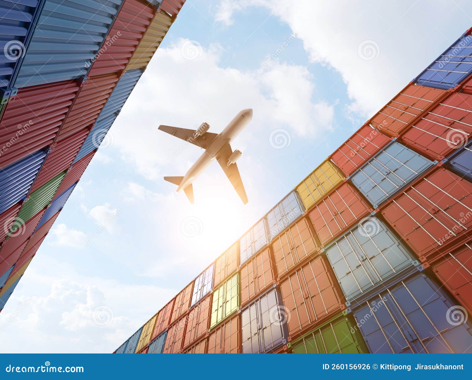 Cargo Plane Flying Above Stack of Containers at Container Port Stock ...