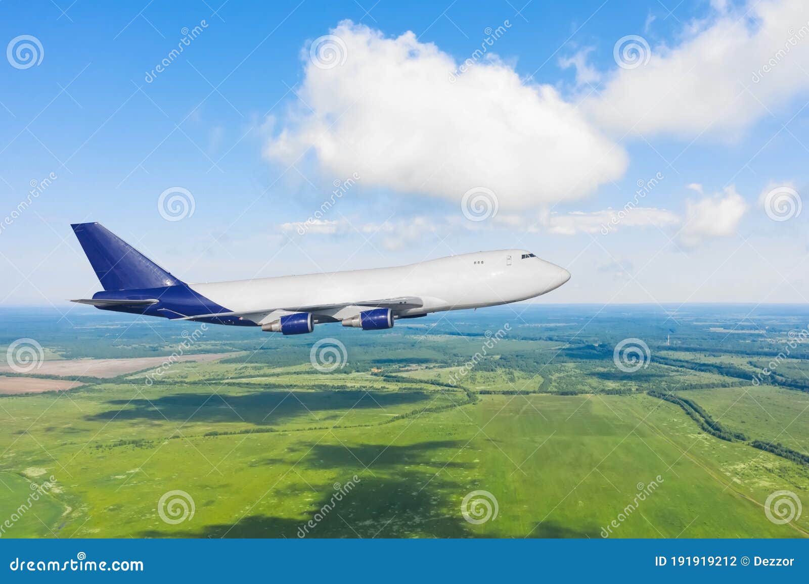 Cargo Plane Flying Over the Ground Side View Stock Photo - Image of ...