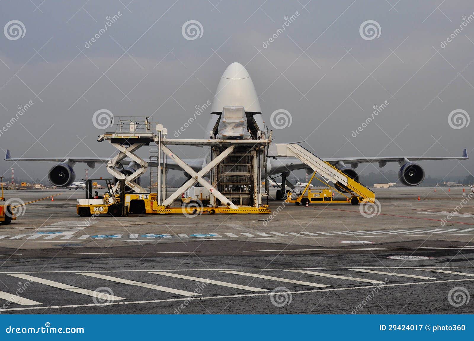Cargo plane loading stock image. Image of heavy, nose - 29424017
