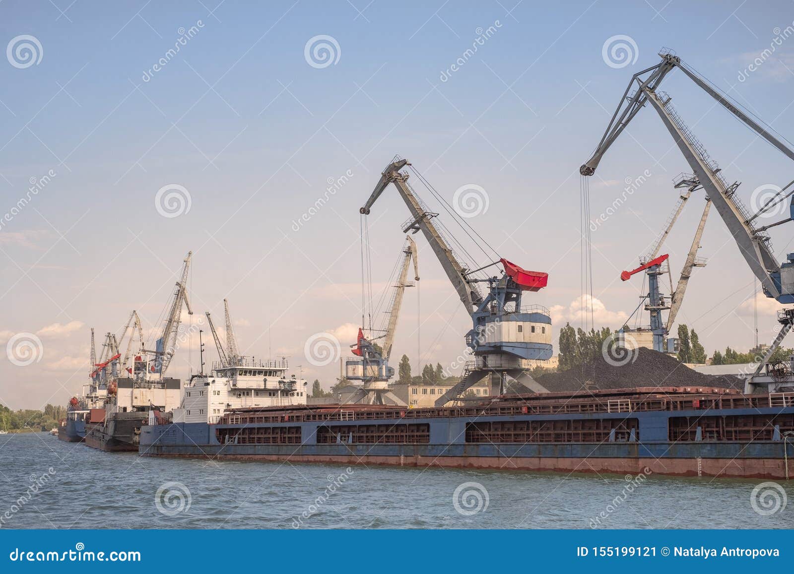 Cargo Port , Barges are for Loading Coal. Portal Cranes , Ship`s Queue ...