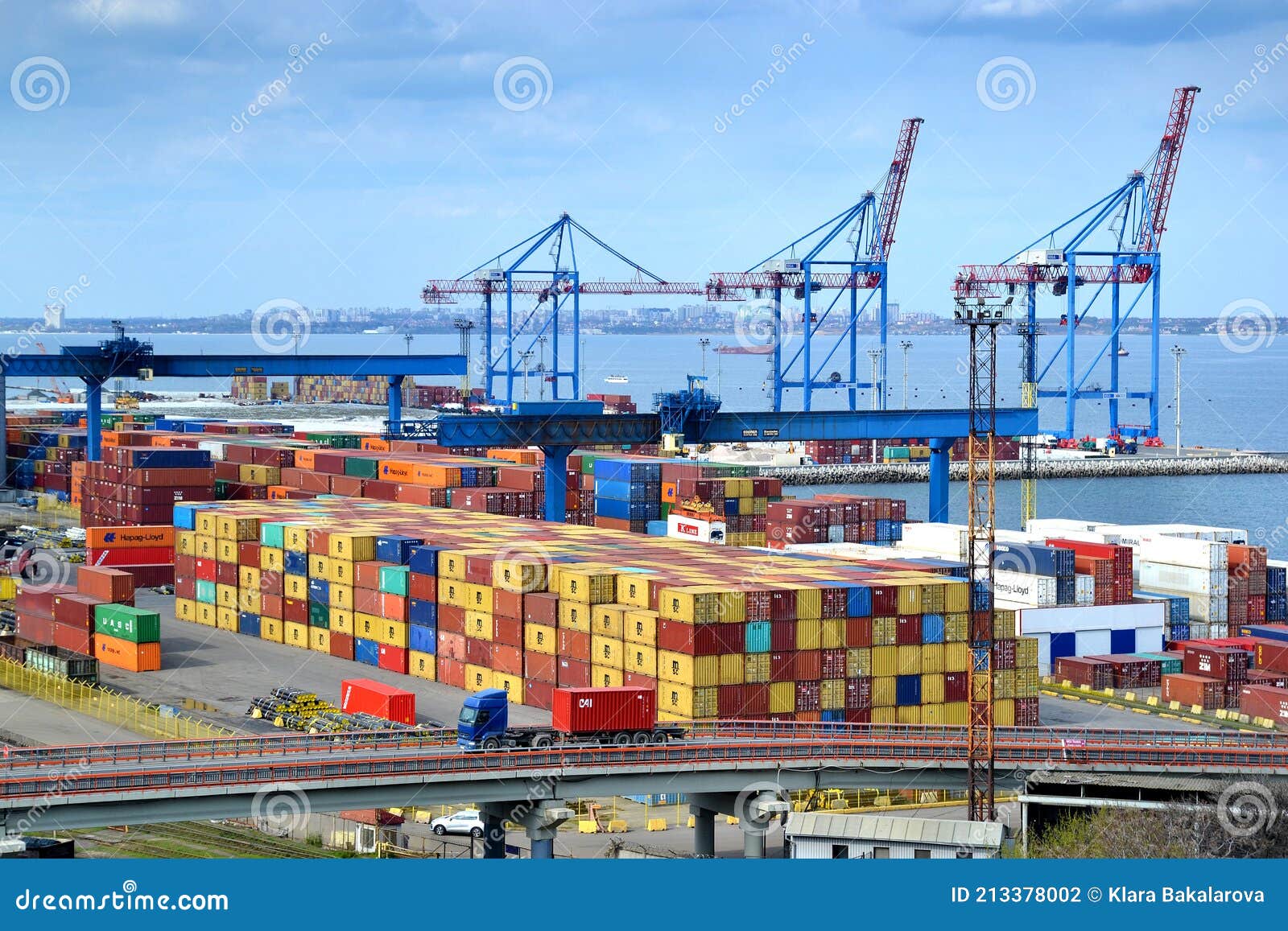 Cargo Port with Different Ships at Pier, Driveway, Trucks Arriving in ...