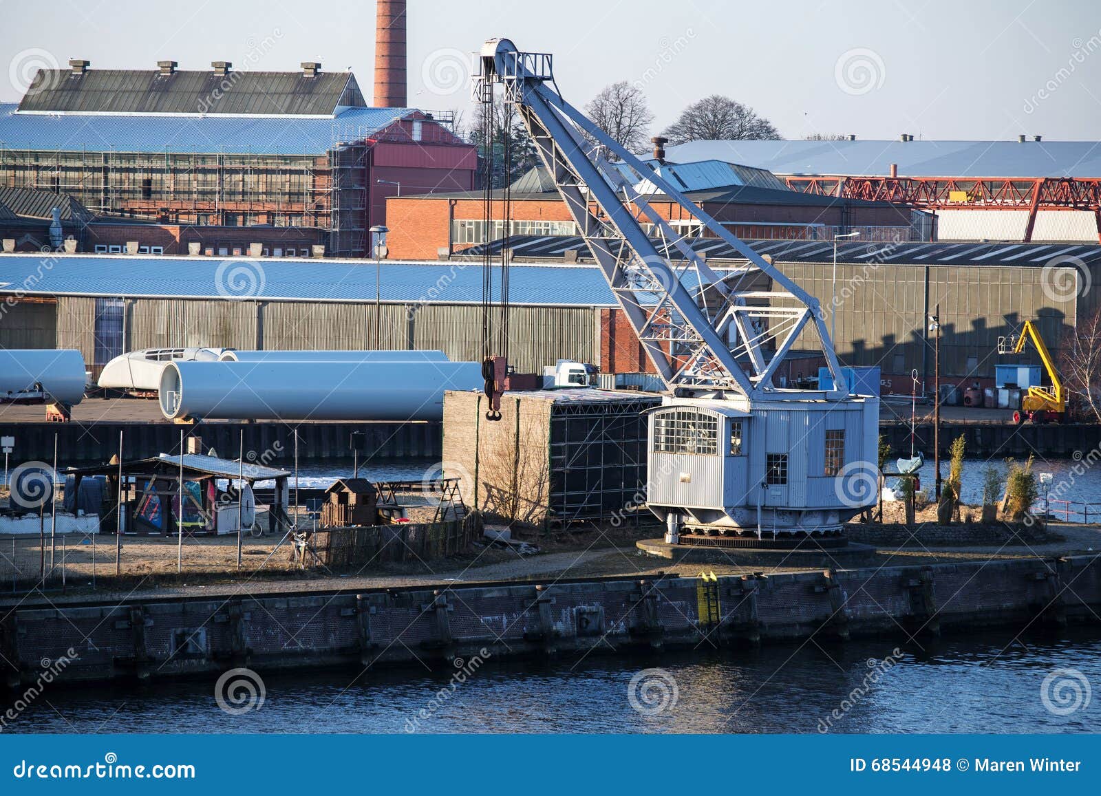 Cargo Port with a Dockyard Crane on the Pier Stock Photo - Image of ...