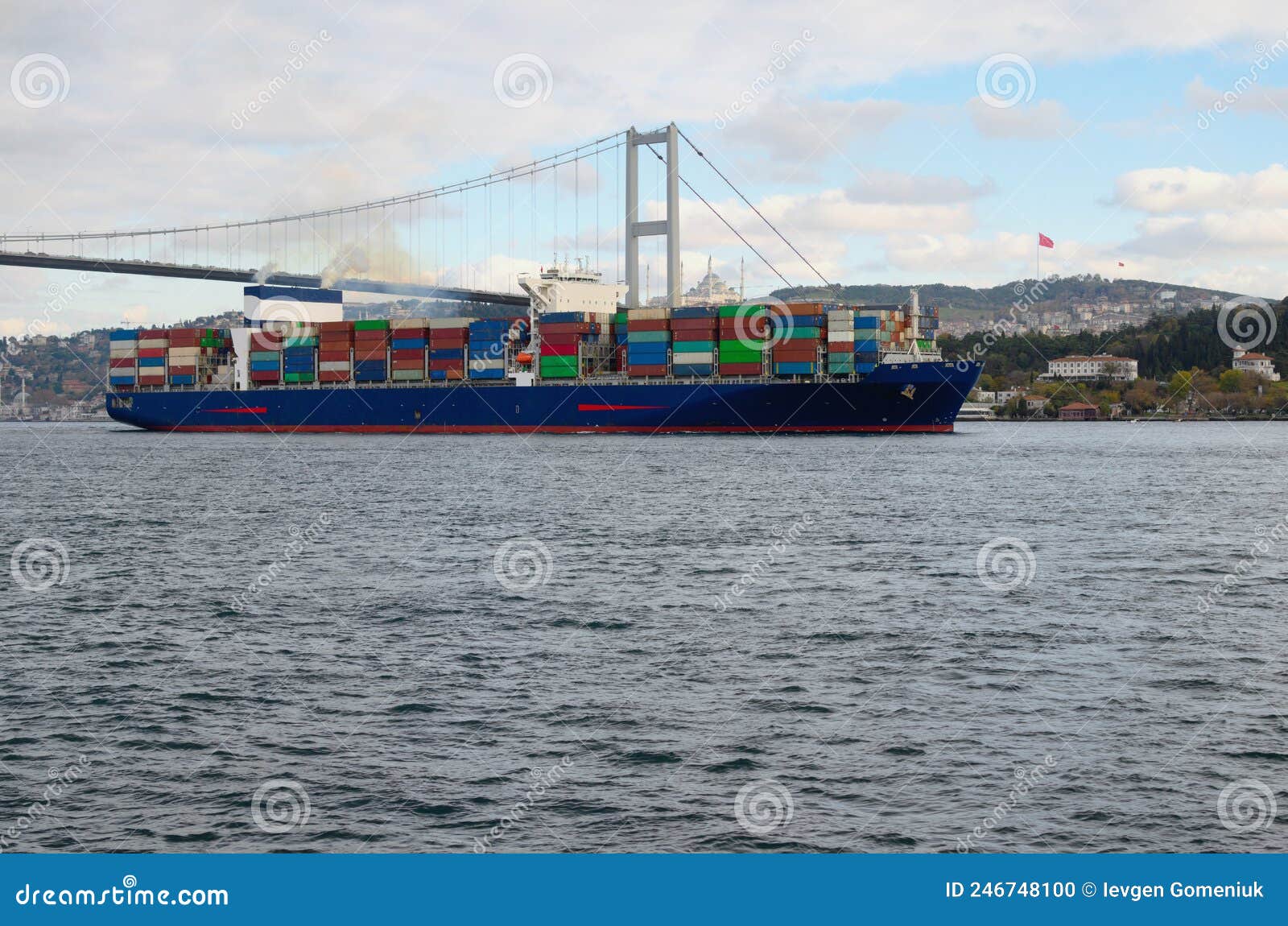 A Cargo Ship in the Bosphorus. Container Ship with Rows of Containers ...