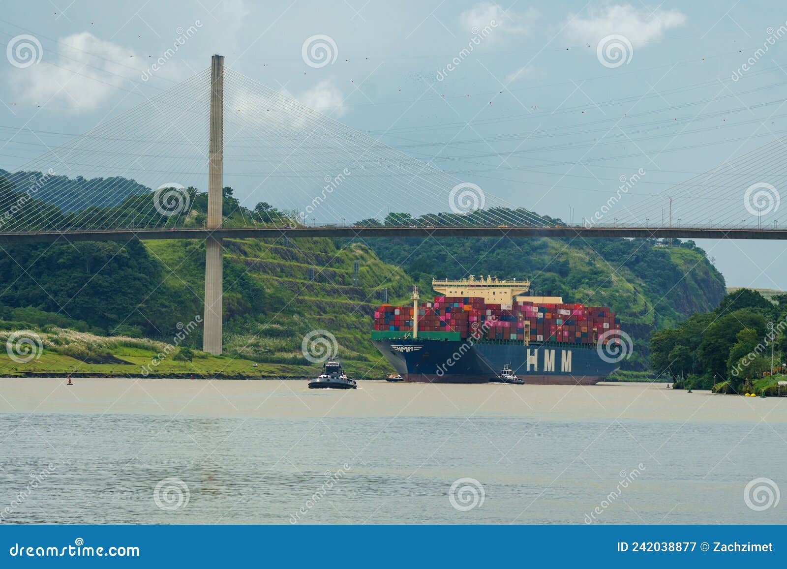 Cargo Ship Crossing Under the Centennial Bridge in the Panama Canal ...