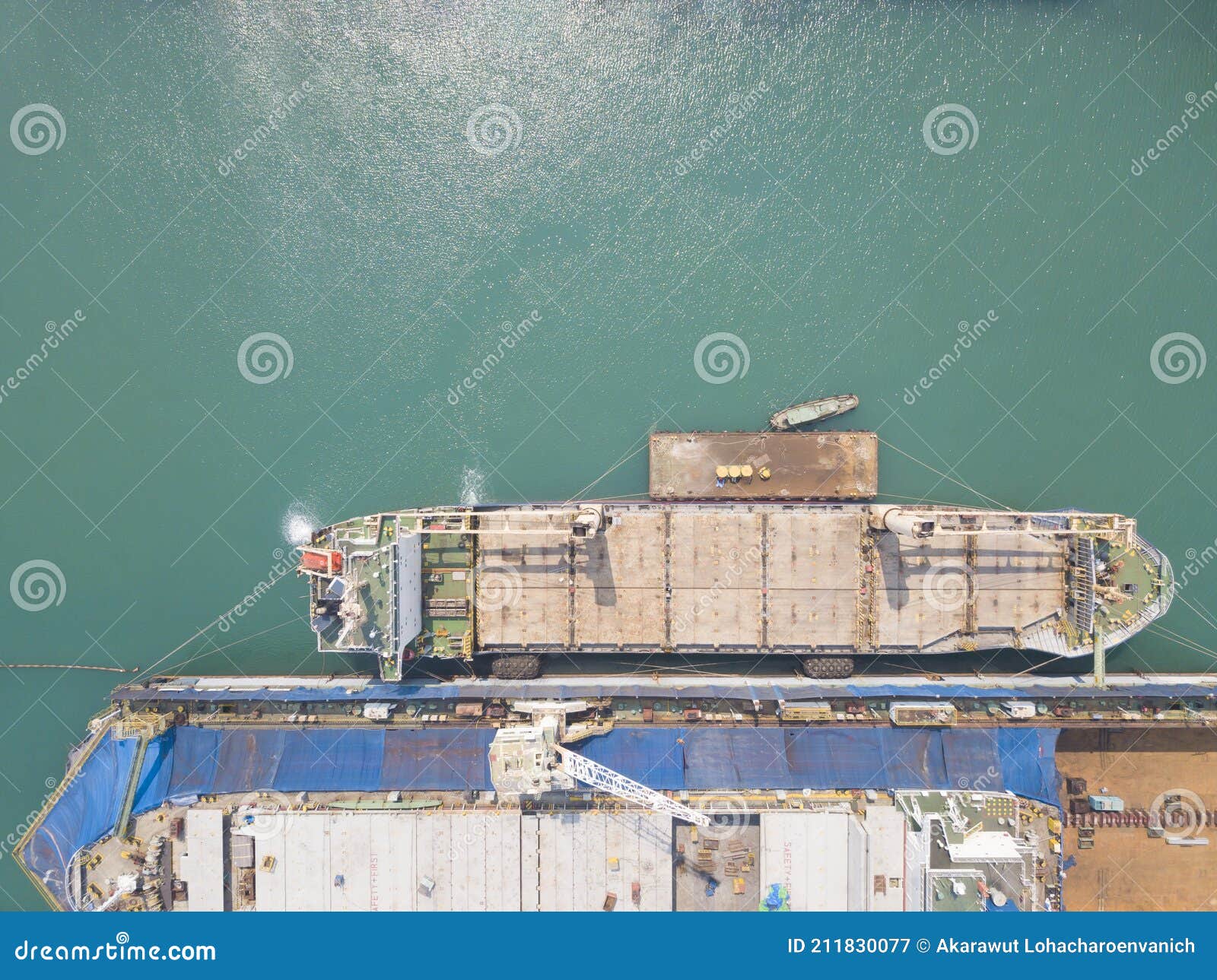 Cargo Ship Docking at the Port Waiting for Loading Container for ... Cargo Ship Docking at the Port Waiting for Loading Container for ...