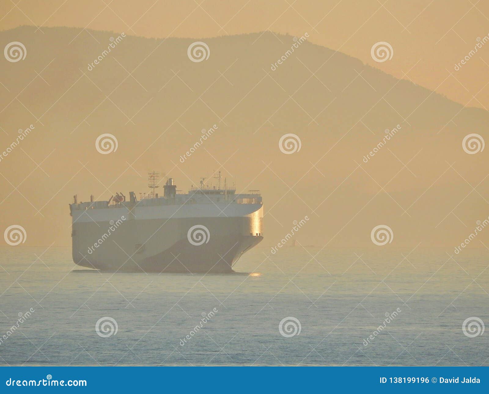 Cargo Ship Freighter Ship at Sunset Stock Photo - Image of storage ...