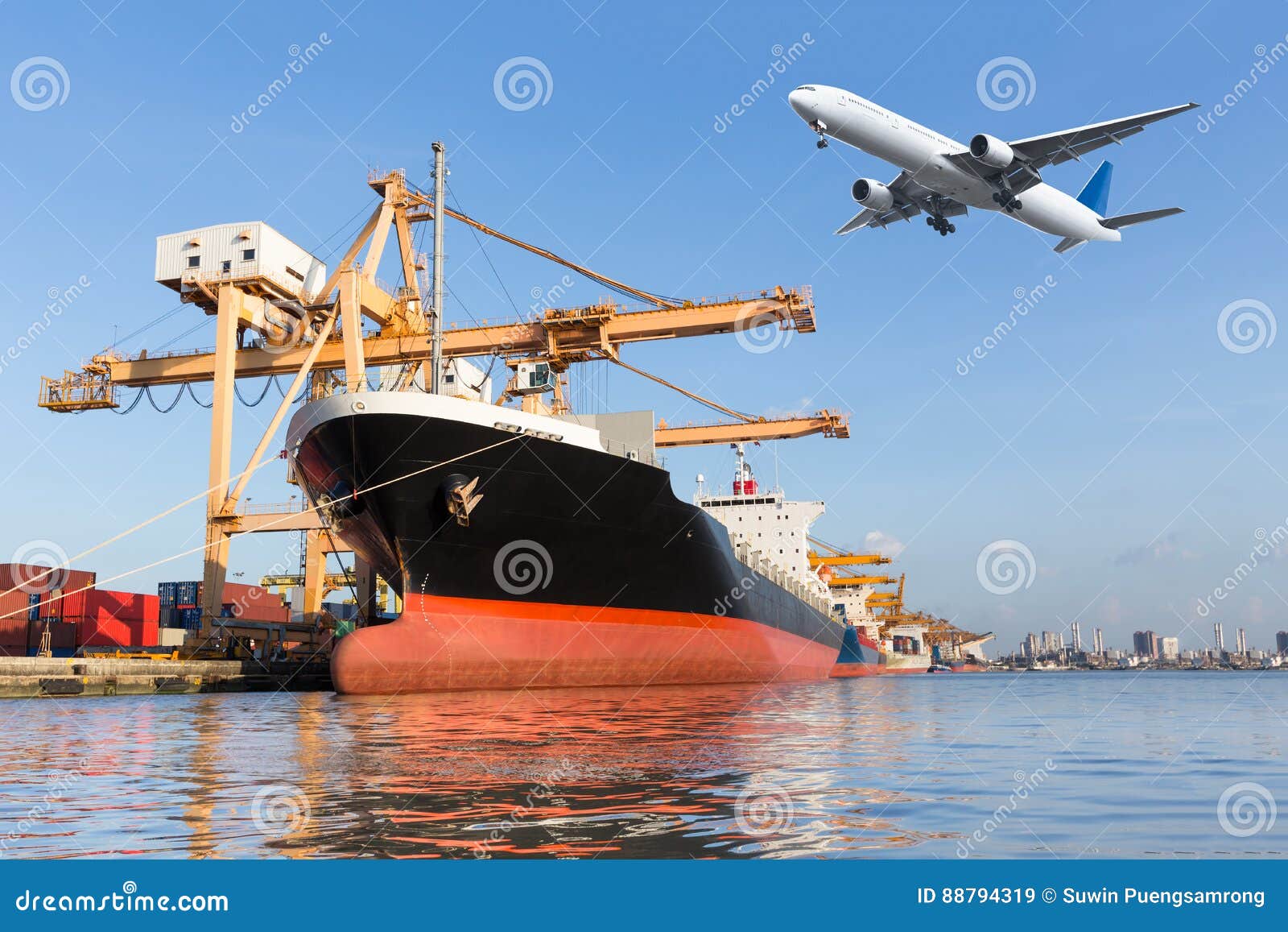 Cargo Ship in the Harbor and Cargo Plane Flying Above Ship Port Stock ...