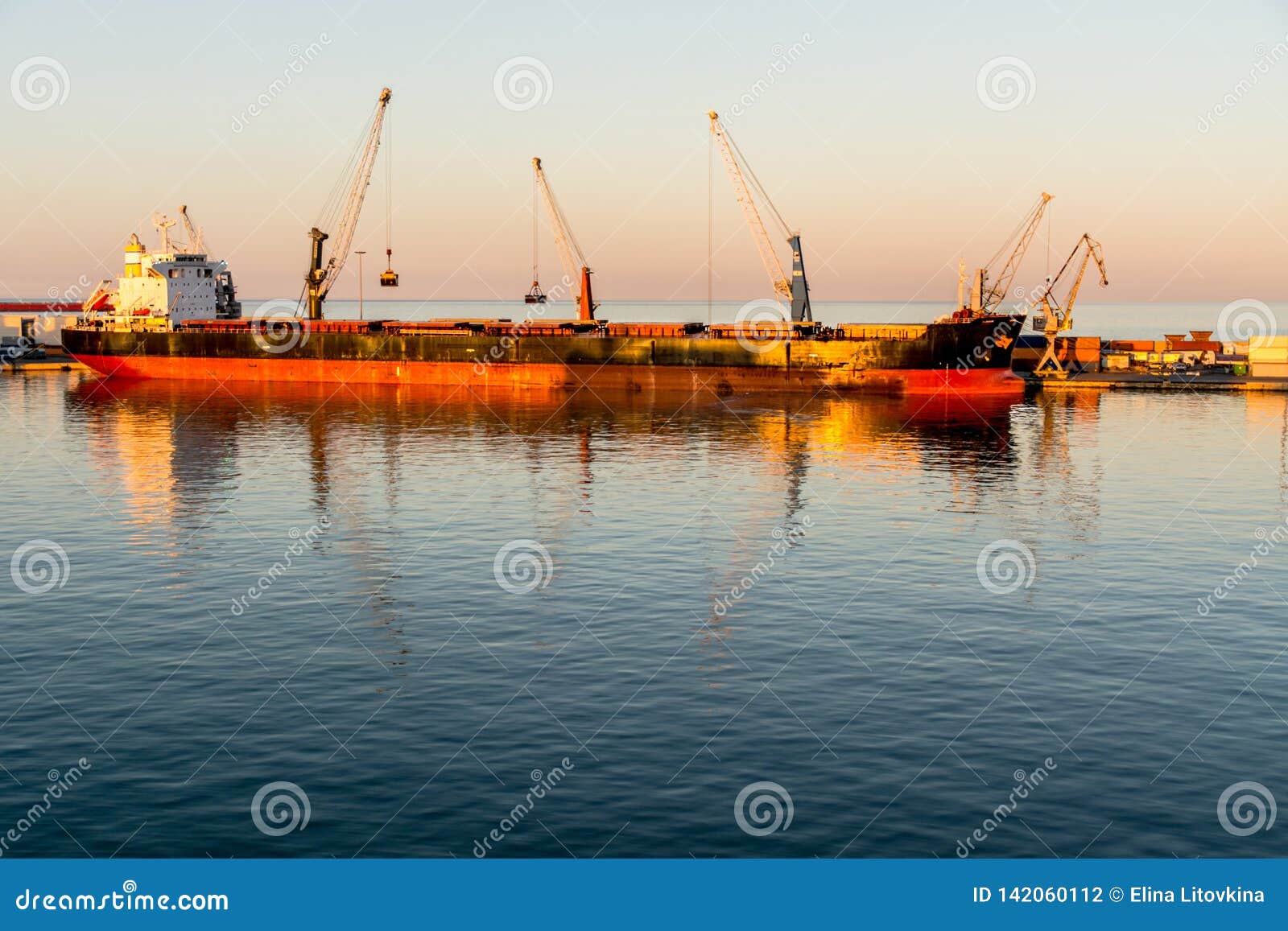 Cargo ship in the harbor stock photo. Image of distribution - 142060112
