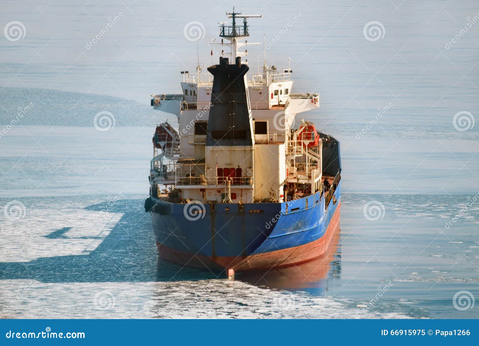 Cargo ship on the ice sea stock image. Image of business - 66915975