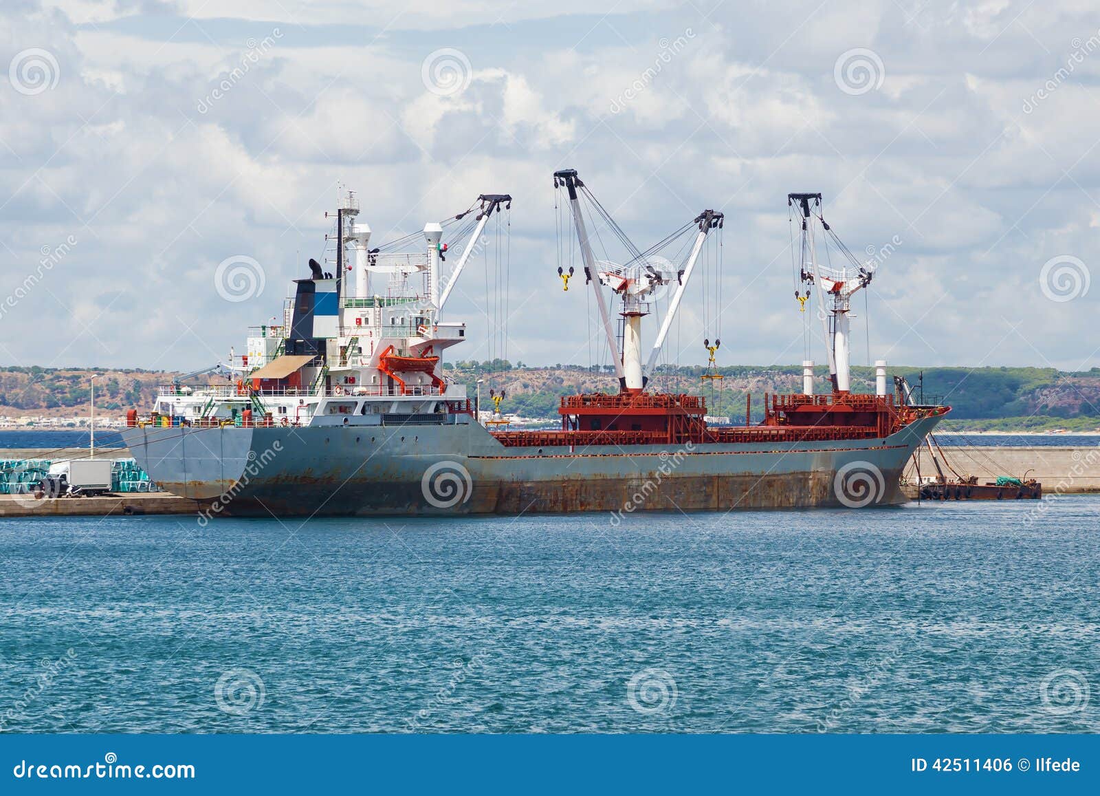 Cargo ship inside harbor stock photo. Image of tanker - 42511406