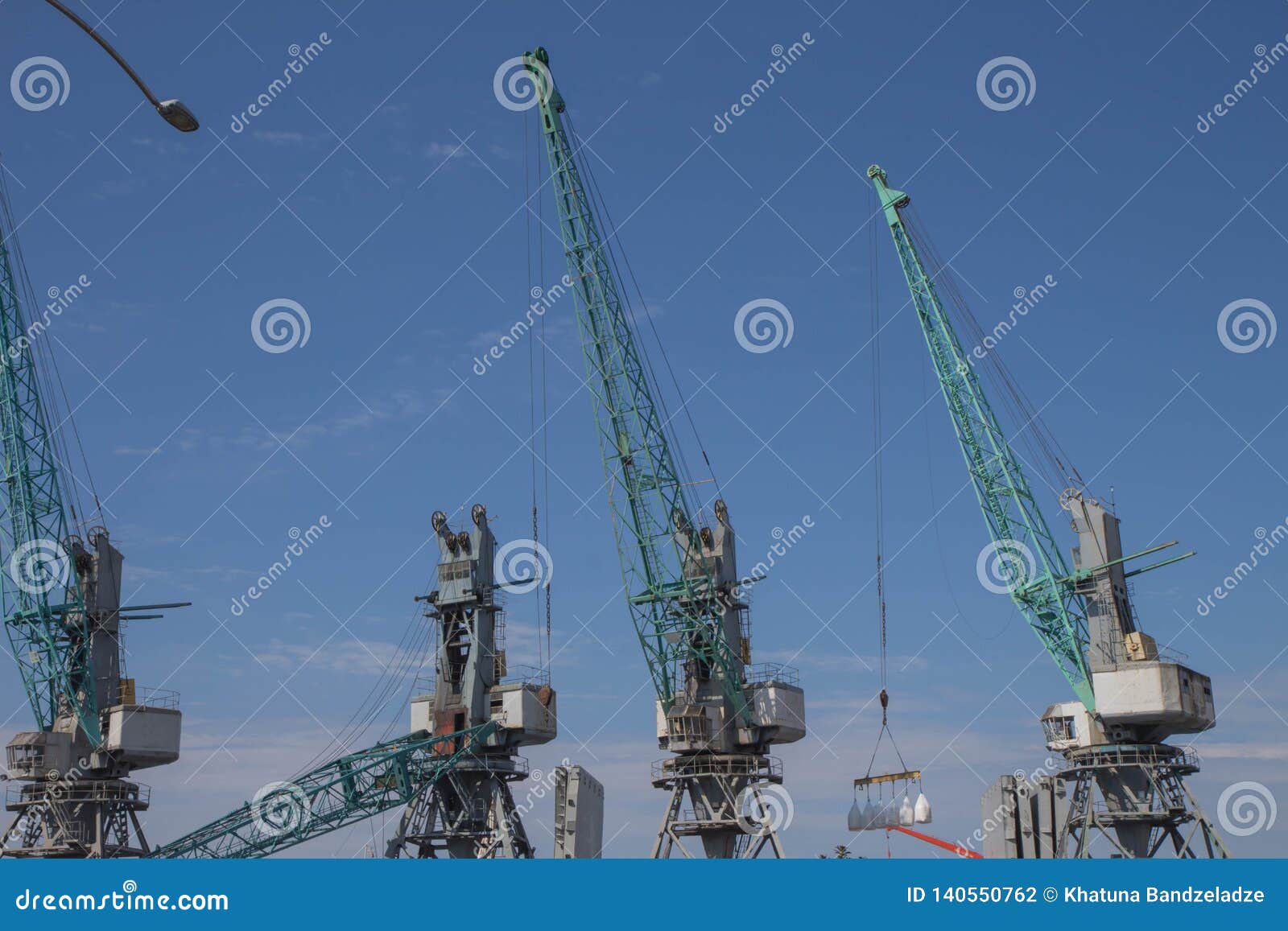 Cargo Ship-lifting Cranes in the Harbor, Industrial Zone Stock Photo ...