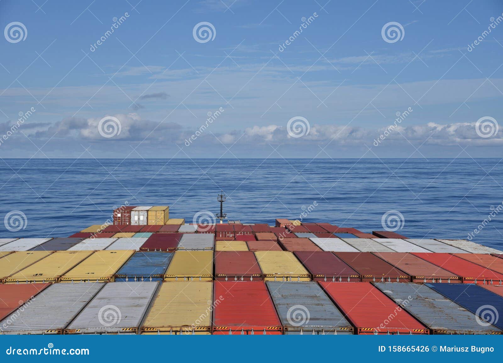 Cargo Ship Loaded with Colorful Containers Sailing through the Ocean ...