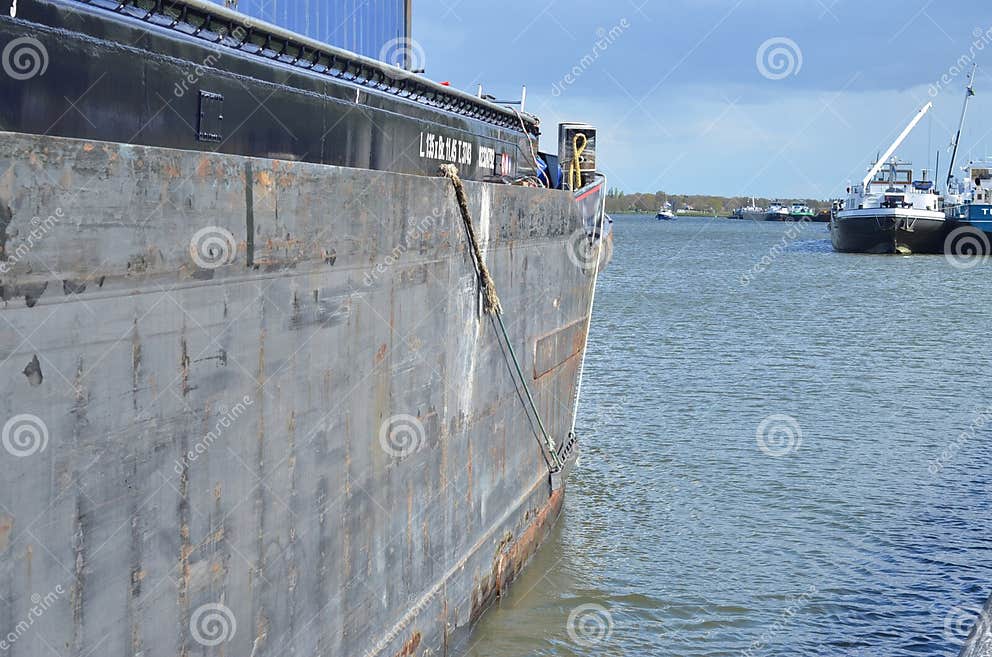 The Cargo Ship is through the Lock and is Sailing on River Meuse Stock ...