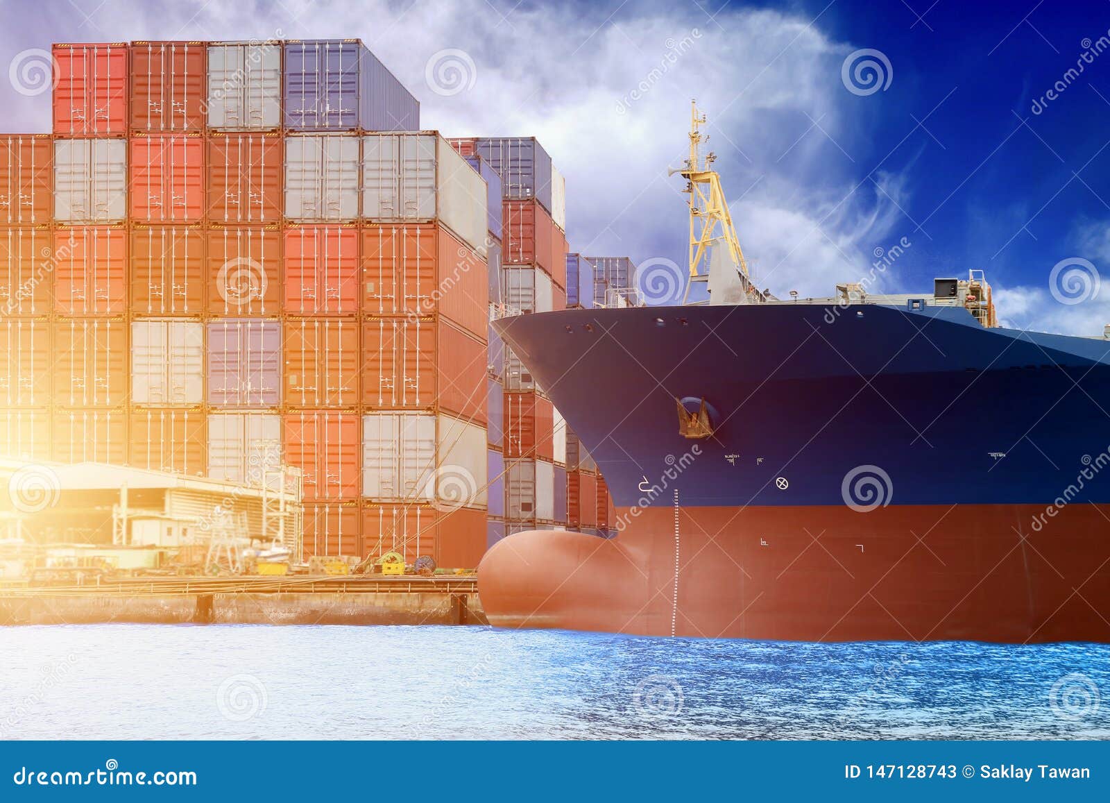 Cargo Ship Moored in the Port on Cargo Container Stacking in Yard ...