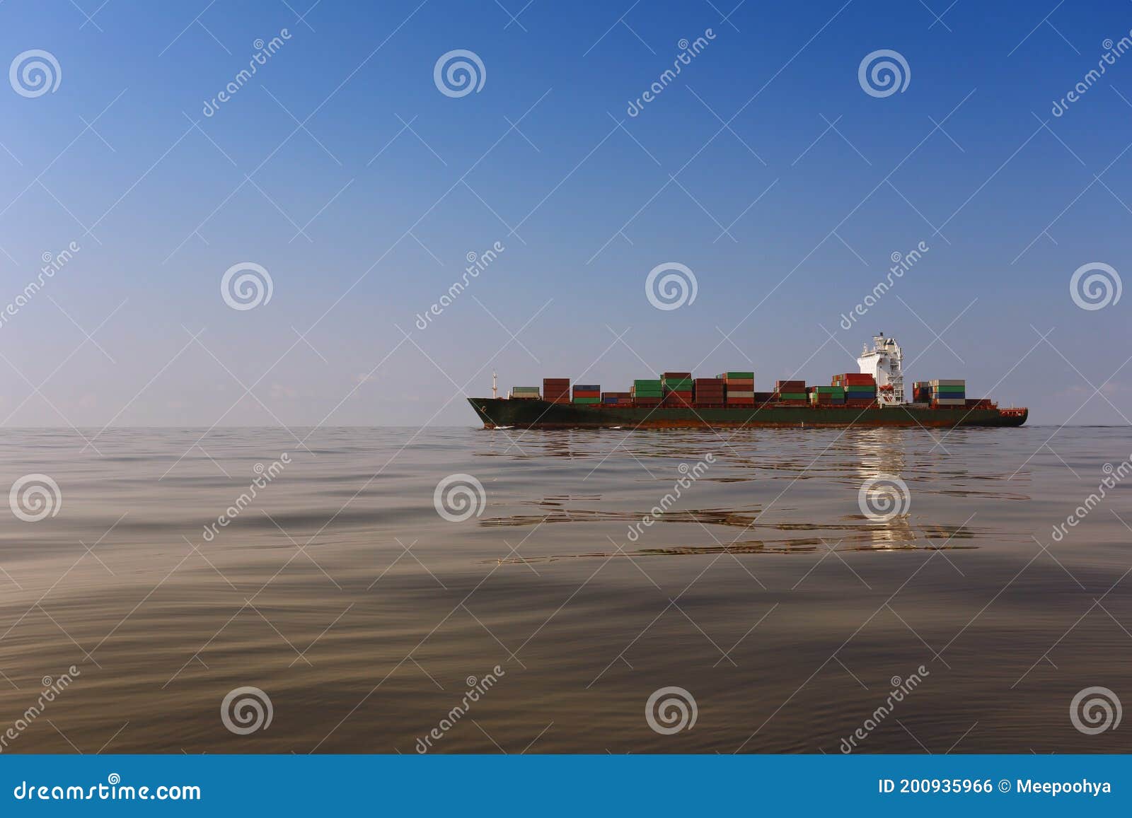 Cargo Ship on the Morning Sea in a Clear Day and Clear Sky Stock Photo ...