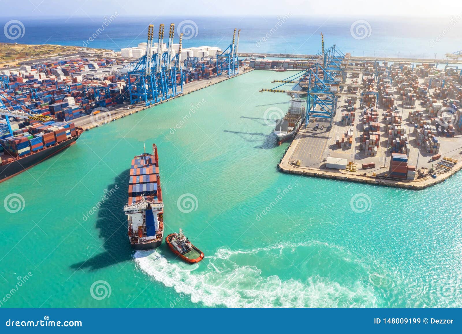 Cargo Ship with Multiple Containers Sails into the Harbor Seaport with ...