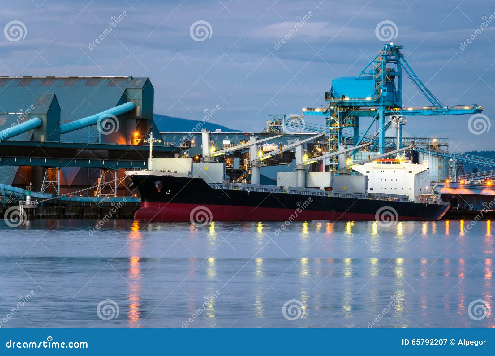Cargo Ship at Night stock image. Image of lights, colourful - 65792207
