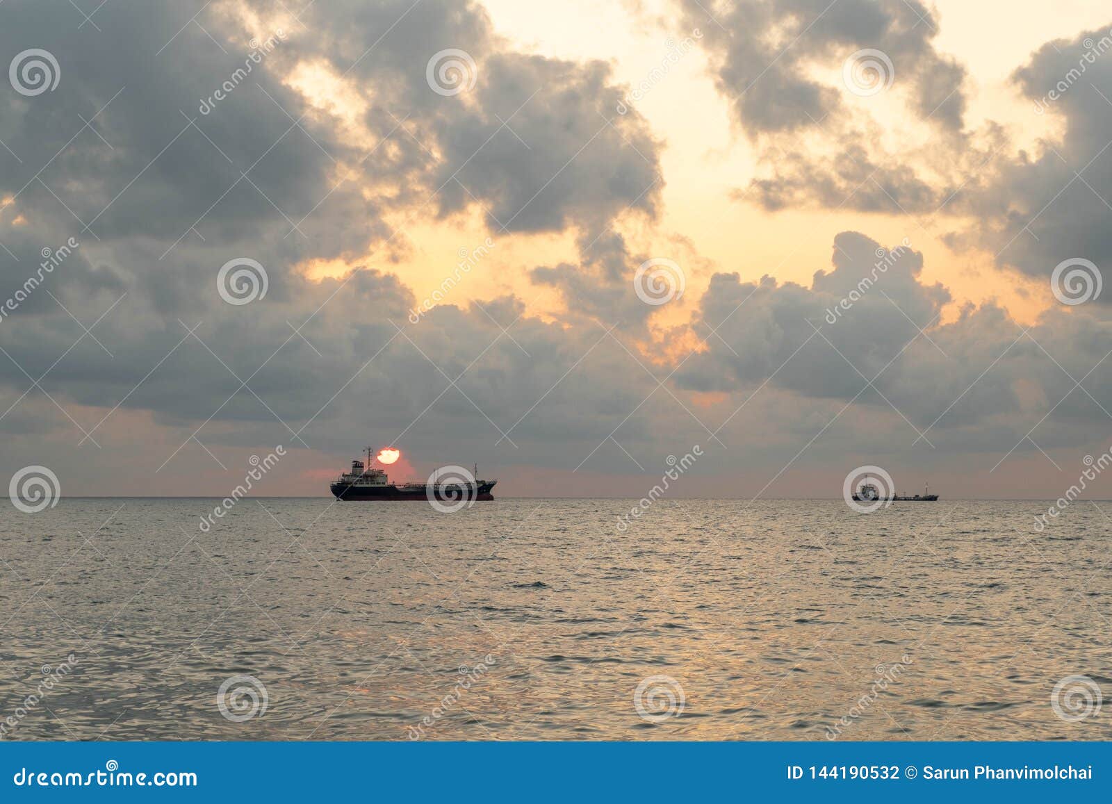 Cargo Ship on the Ocean with Sunrise Stock Photo - Image of harbor ...