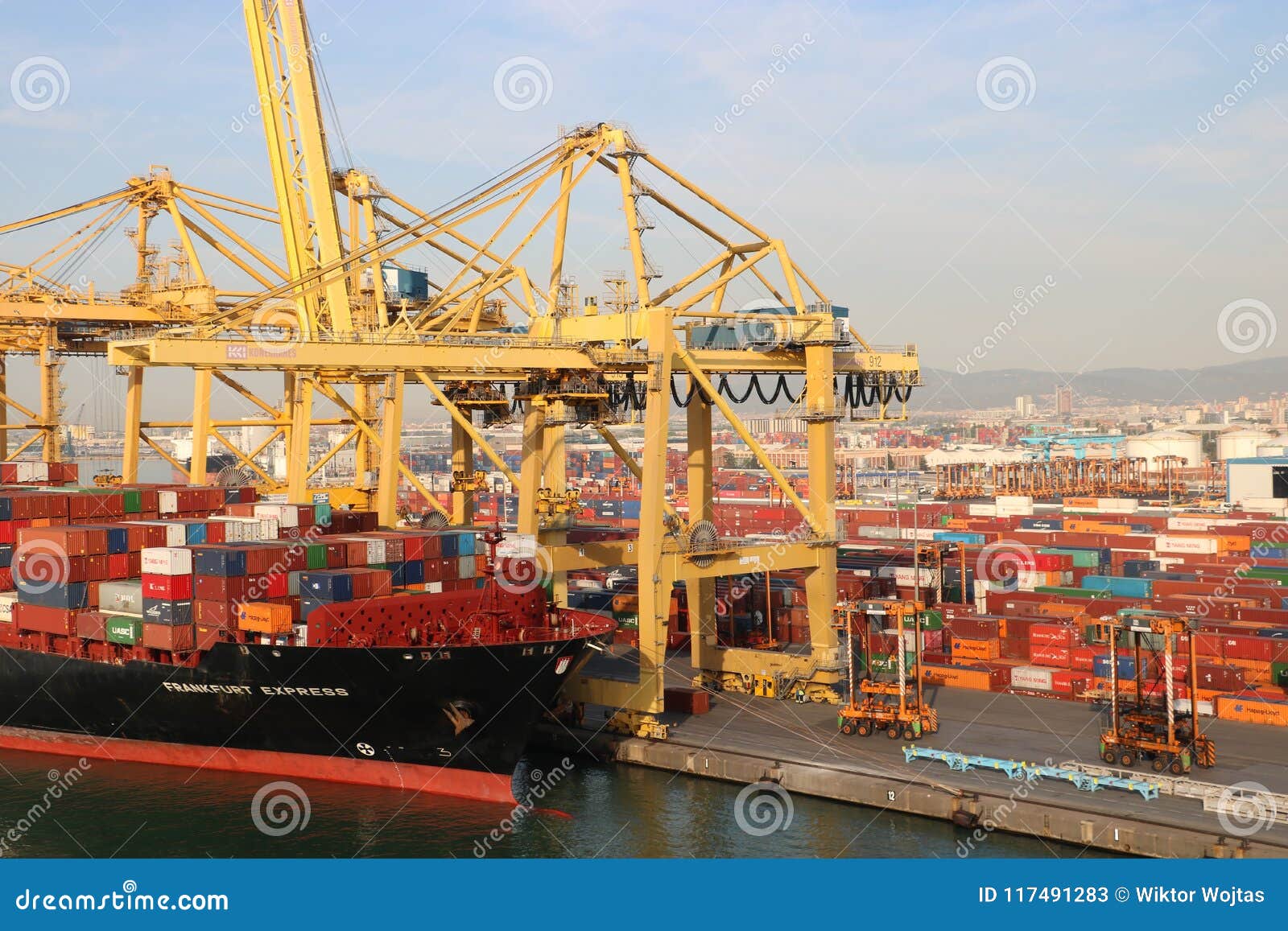 Cargo ship in a port editorial stock photo. Image of loading - 117491283