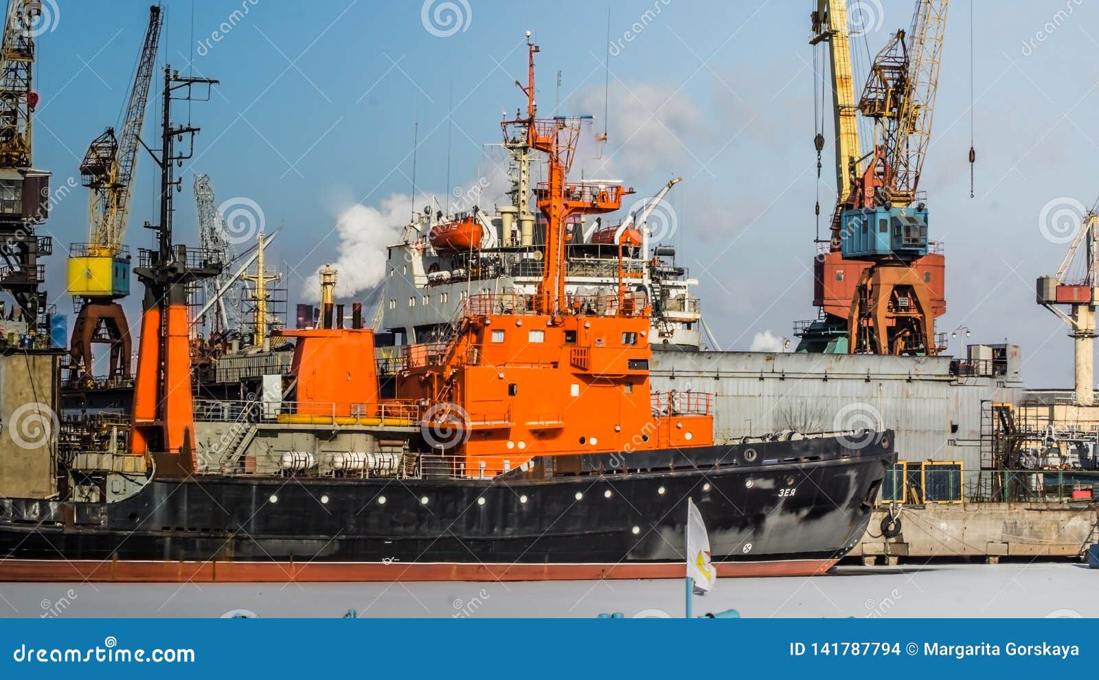 Cargo ship at the port editorial stock image. Image of sailing - 141787794