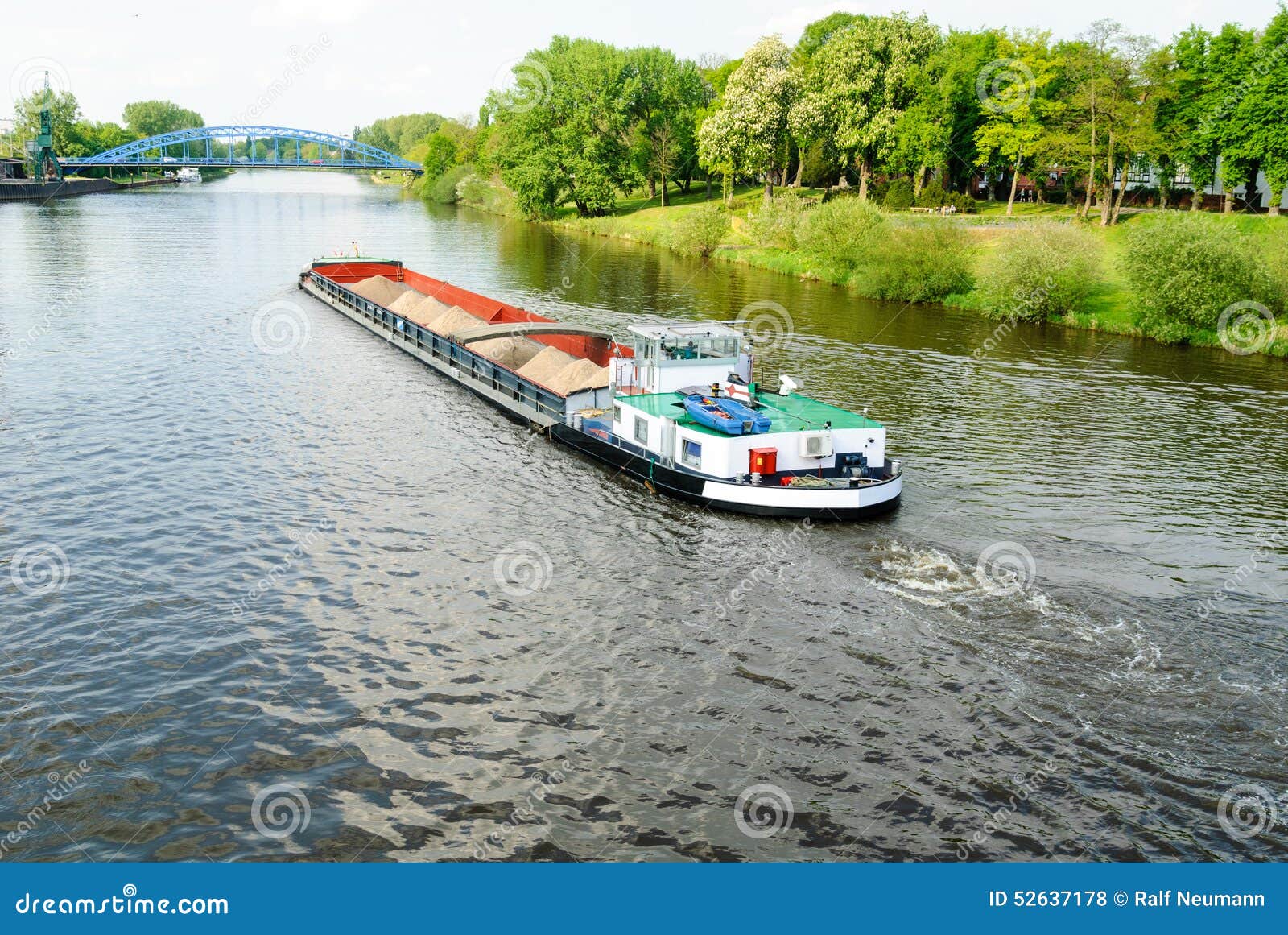 Cargo ship on a river stock photo. Image of ship, water - 52637178