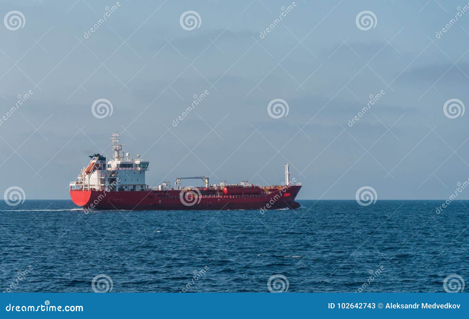 Cargo Ship Sailing in Open Sea Stock Image - Image of blue, commercial ...