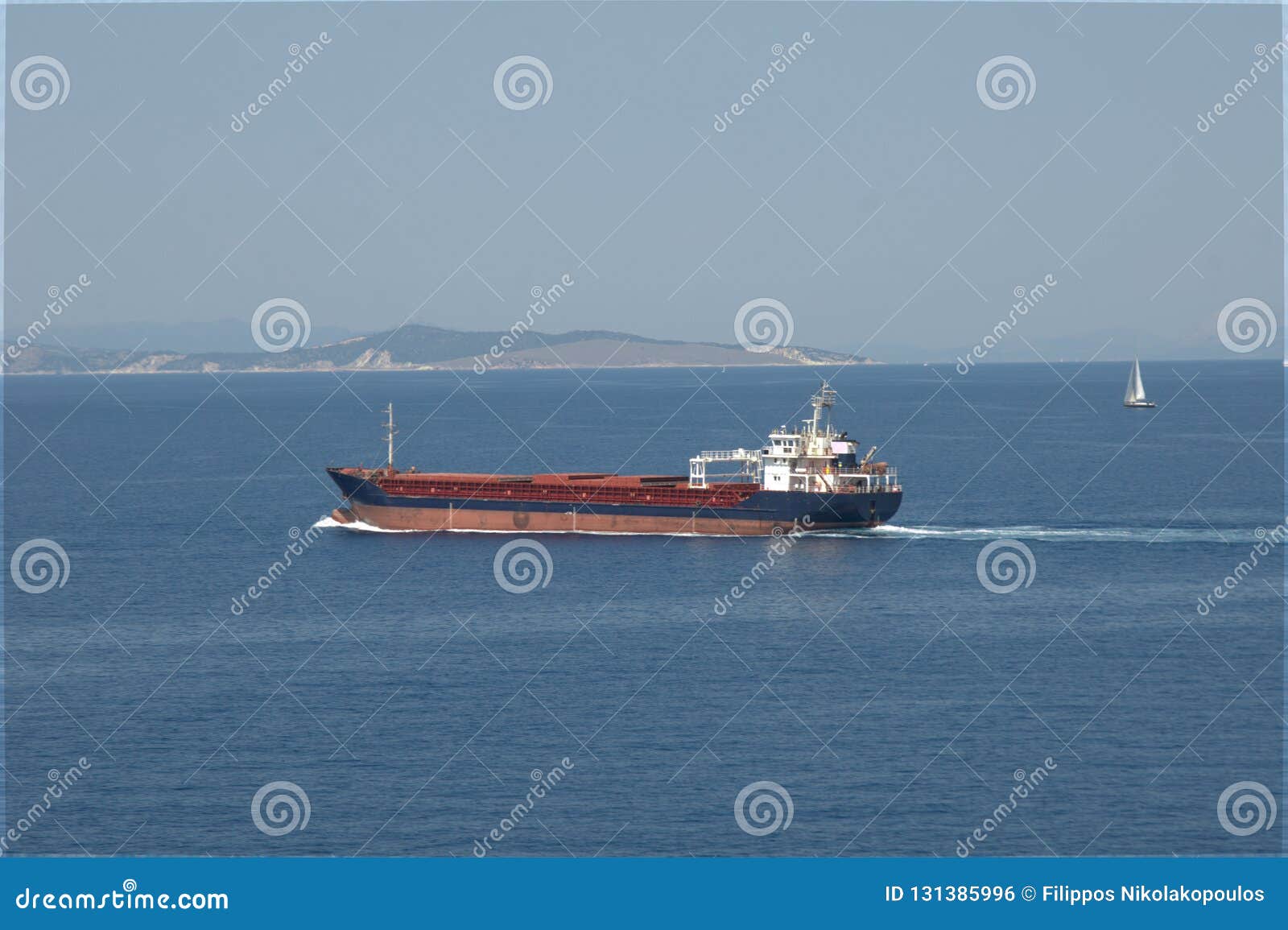 Cargo Ship Sailing at Open Sea Stock Photo - Image of metal, commerce ...