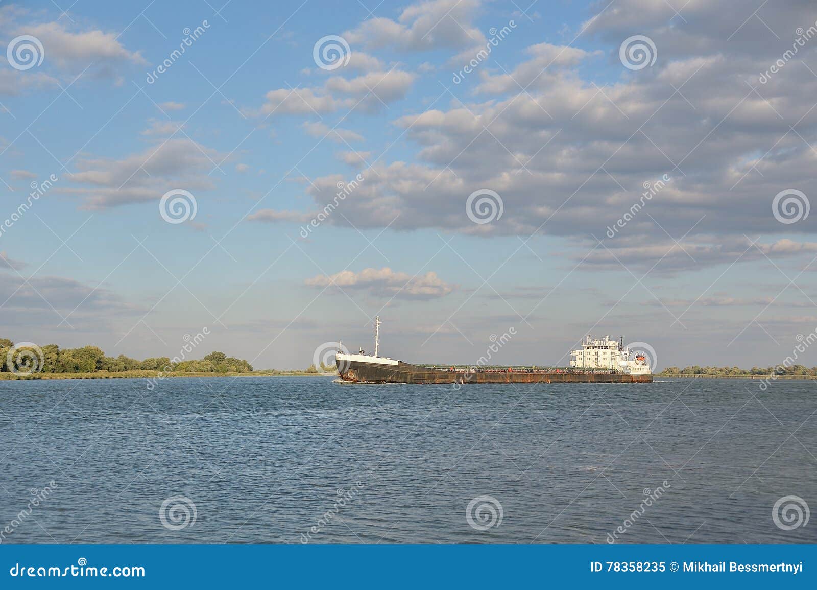 A Cargo Ship Sails on the River Stock Image - Image of truck, schedule ...