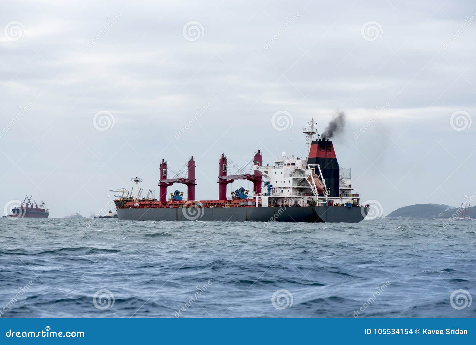 Cargo Ship at sea stock photo. Image of marine, export - 105534154