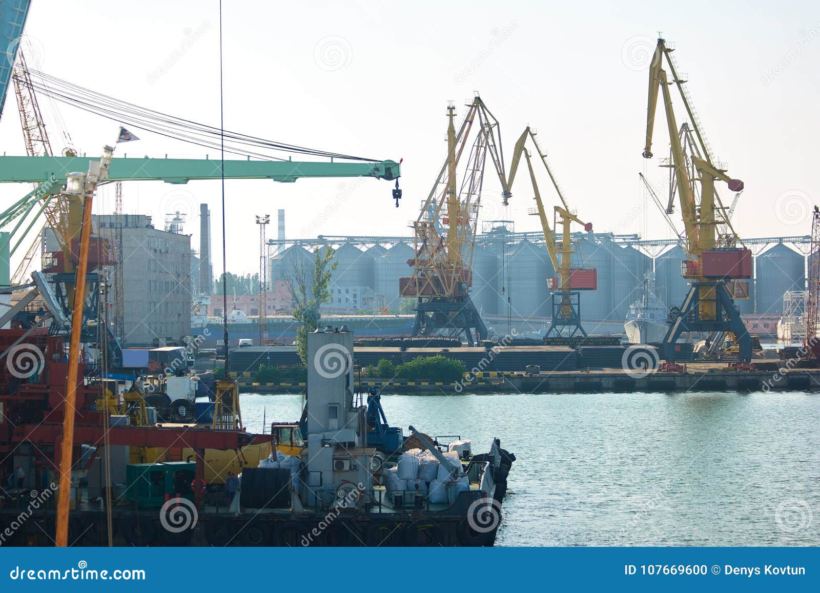 Cargo Ship in Seaport. stock photo. Image of delivery - 107669600