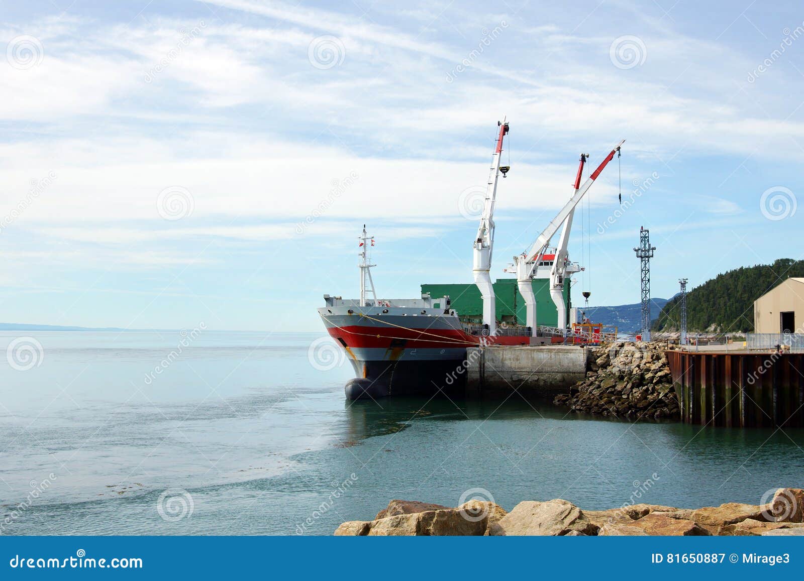 Cargo ship at small dock stock image. Image of crane - 81650887