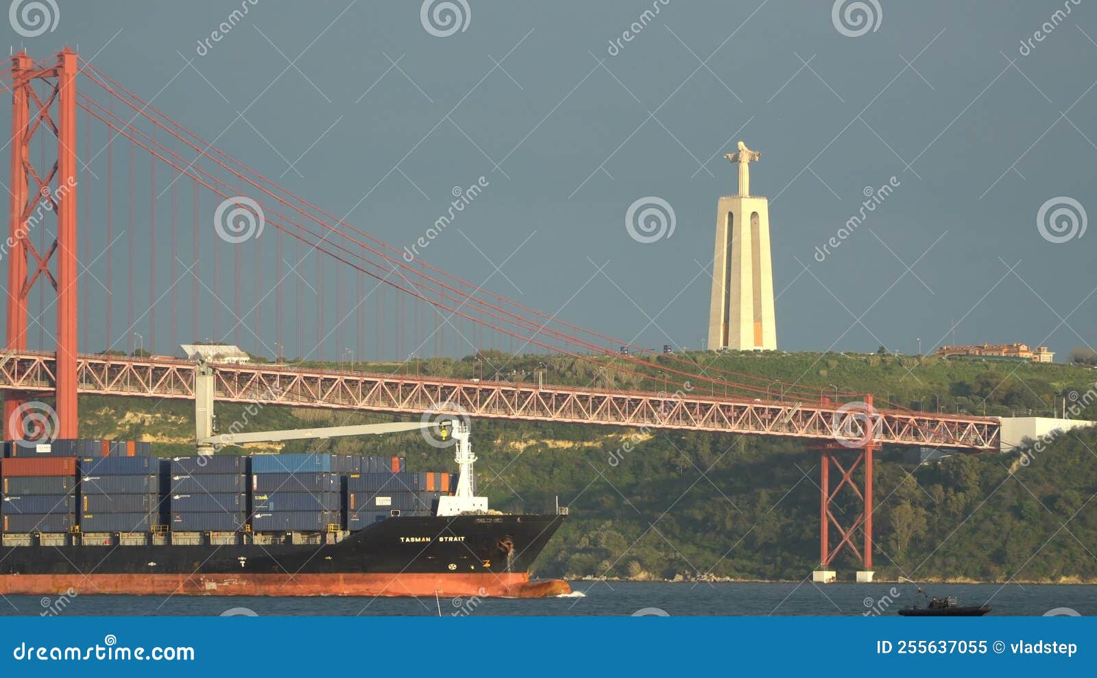 Cargo Ship Under the Bridge Stock Video - Video of city, loading: 255637055