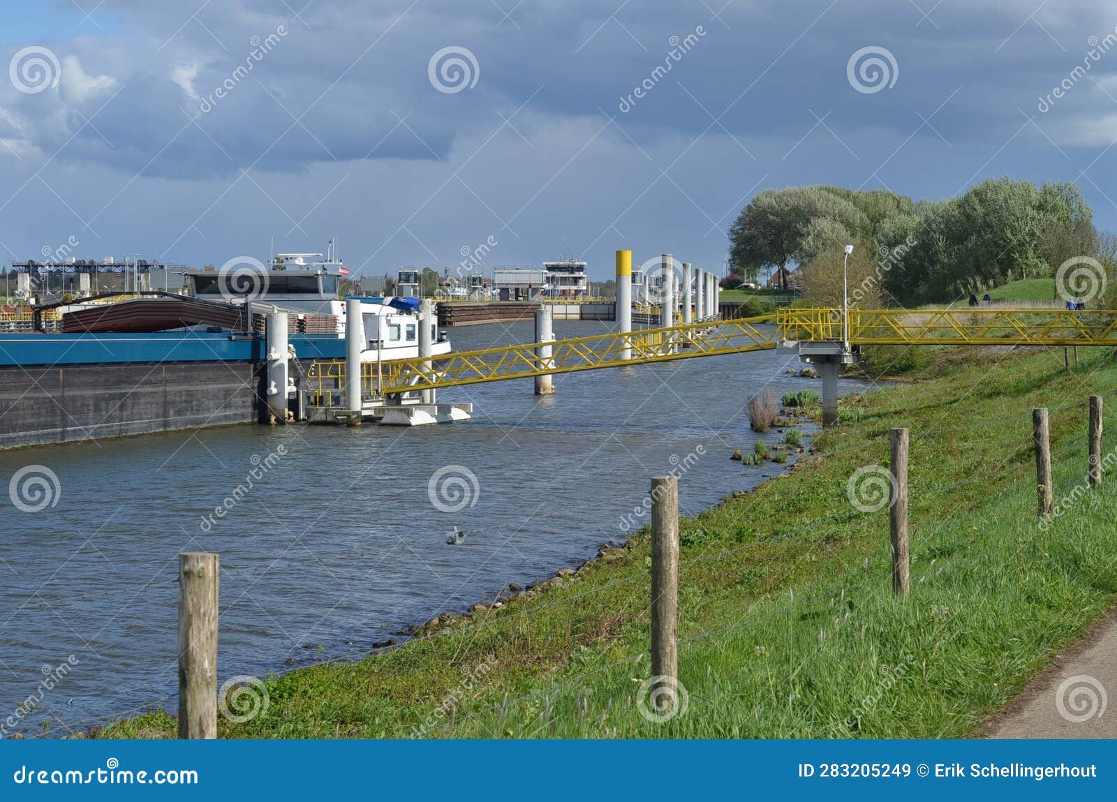 A Cargo Ship is Waiting at the Lock of Sambeek Stock Image - Image of ...