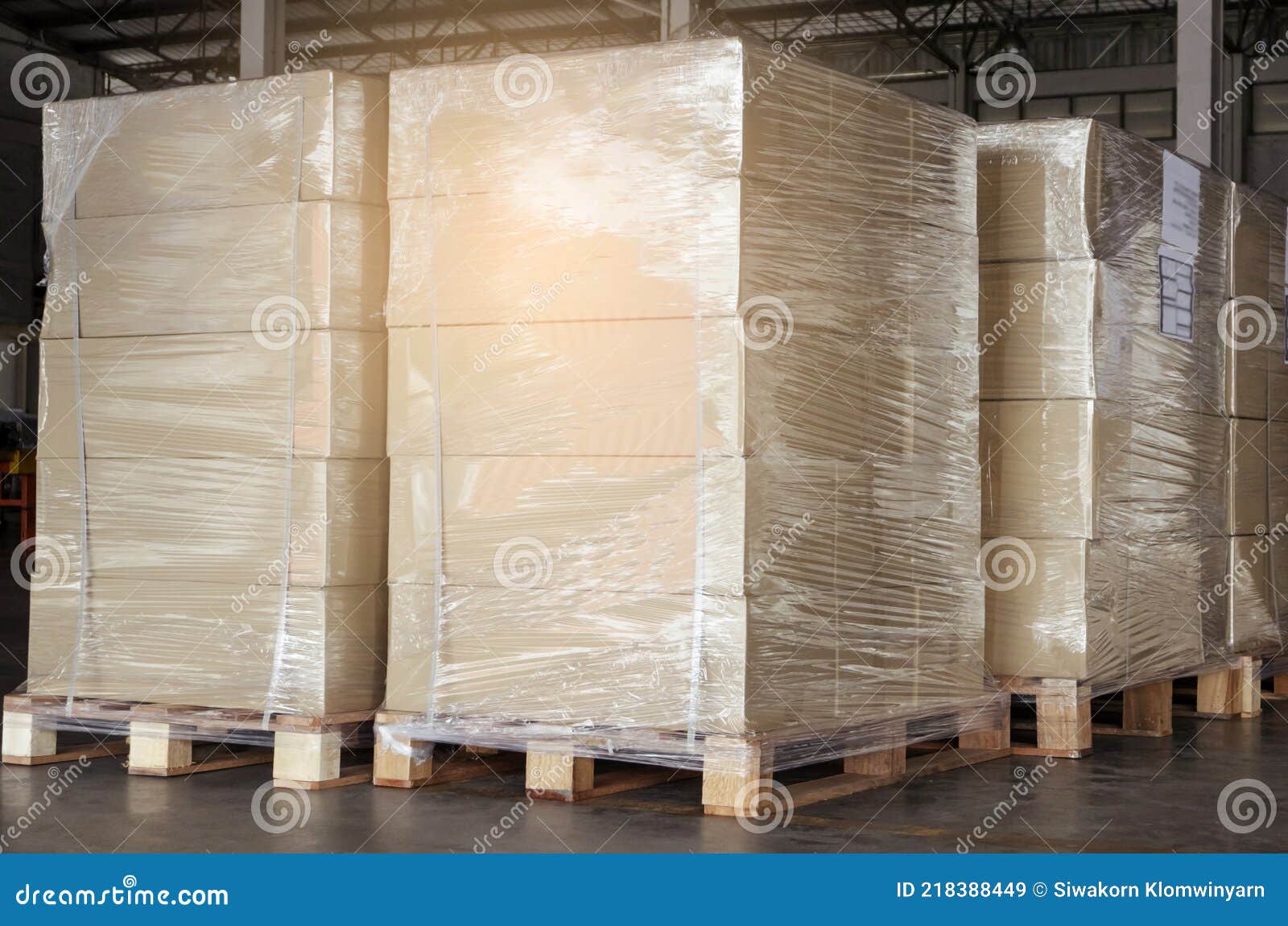 Stack Of Package Boxes On Wooden Pallet At Storage Warehouse. Carton ...